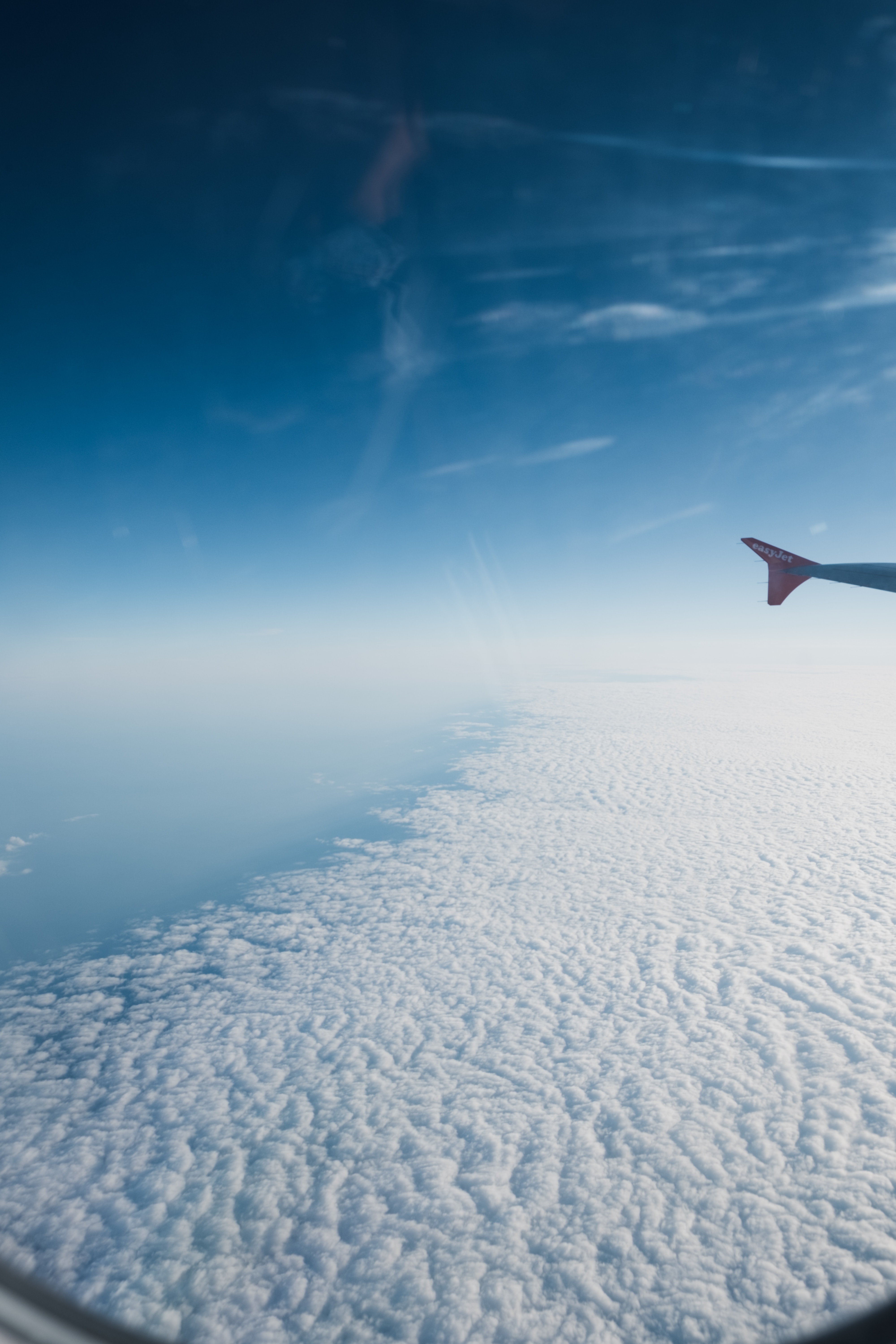 Download wallpaper 4000x6000 airplane, wing, clouds, sky, view hd ...