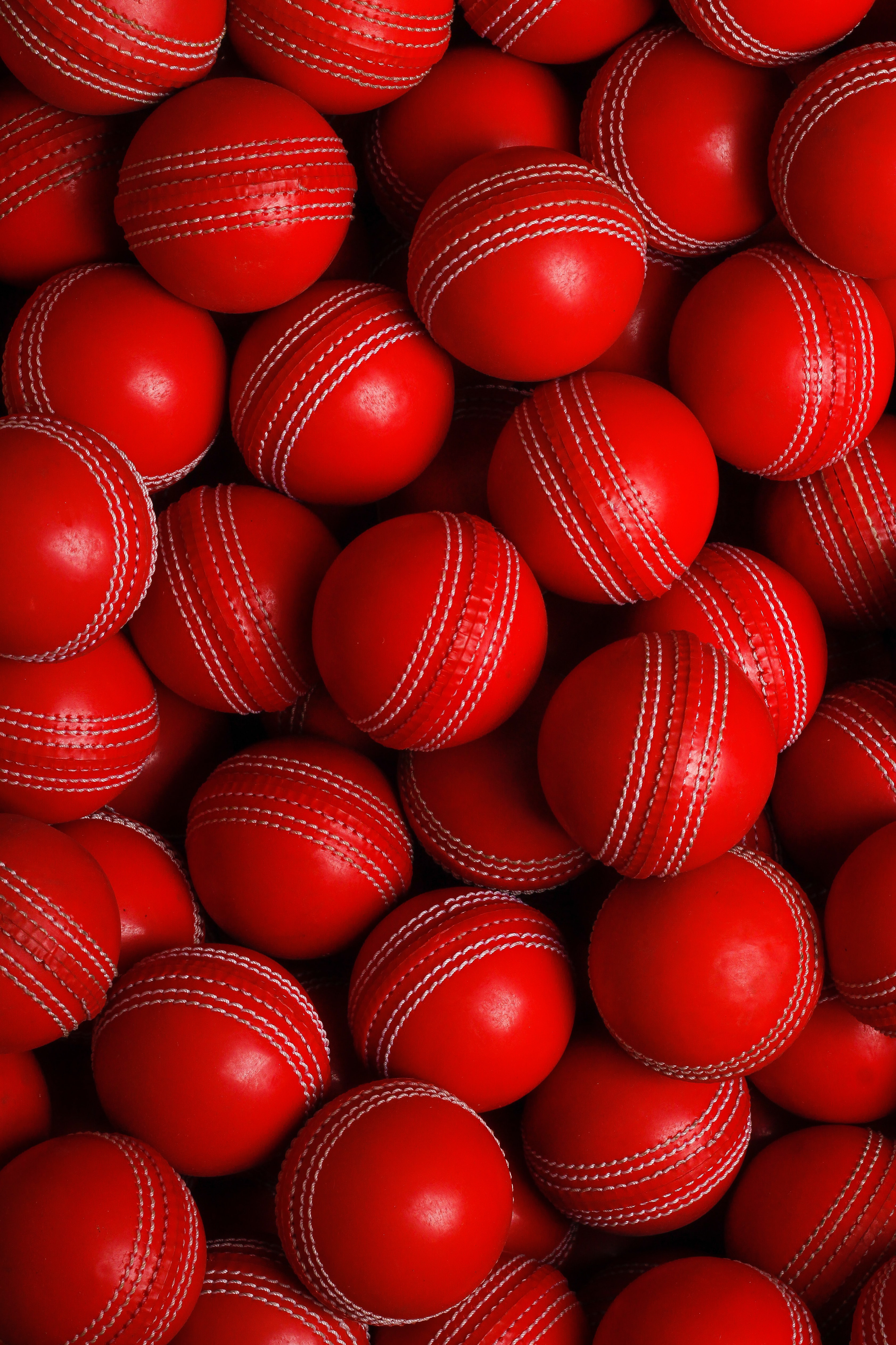 Download wallpaper 3366x5049 balls, red, round, sport hd background