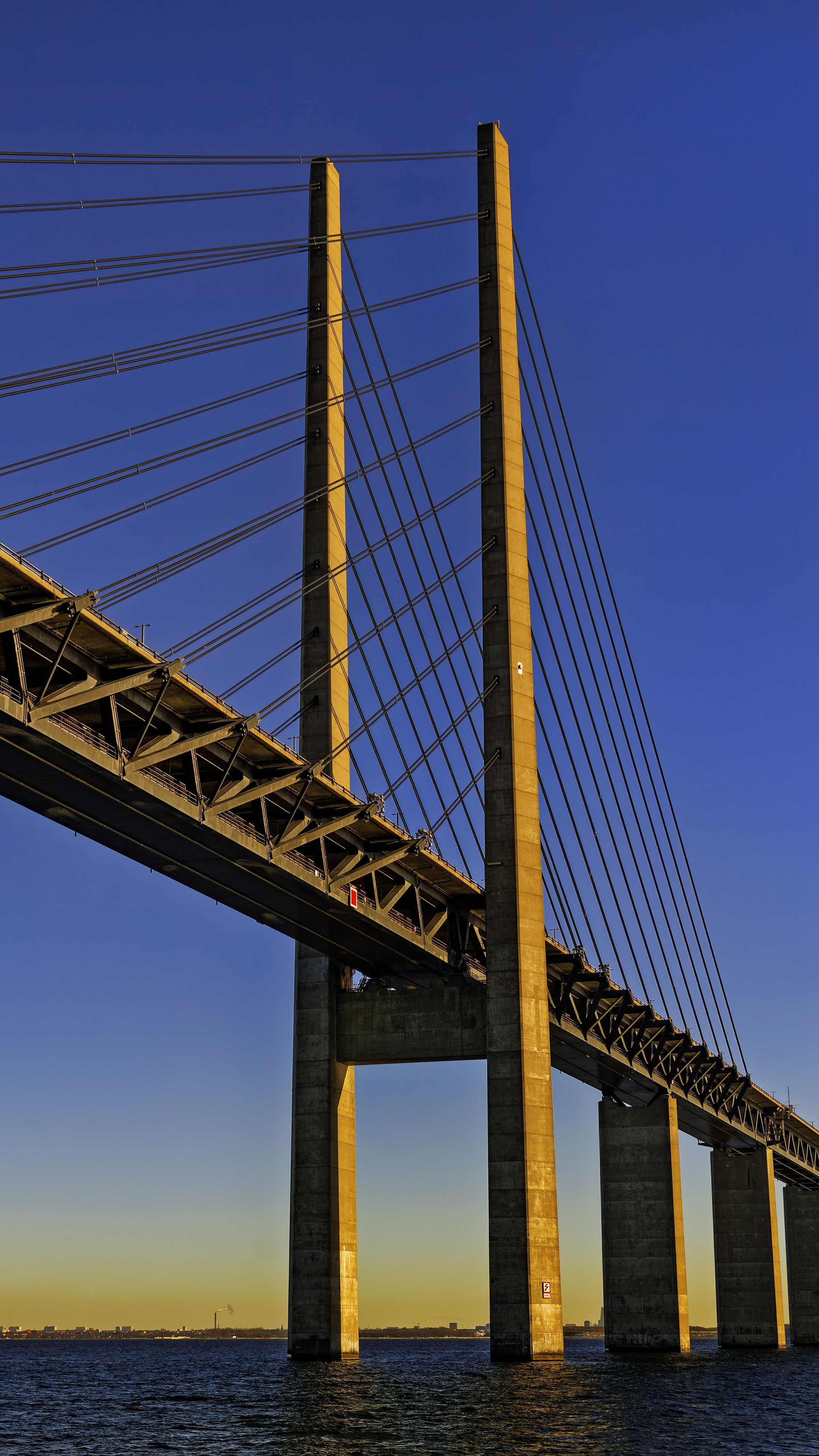 Download wallpaper 2160x3840 bridge, columns, river, water, horizon ...