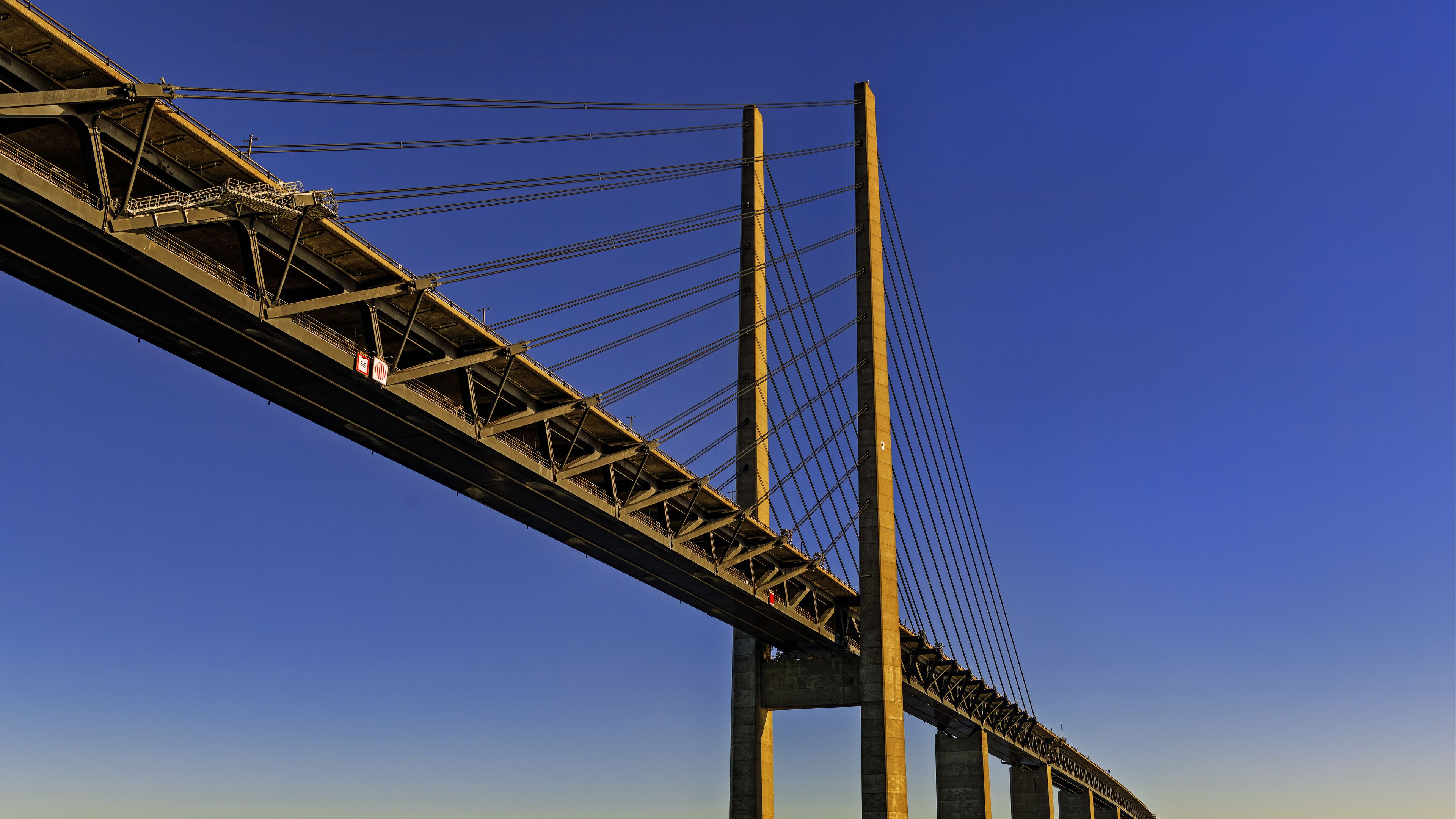 Download wallpaper 3840x2160 bridge, columns, river, water, horizon 4k ...