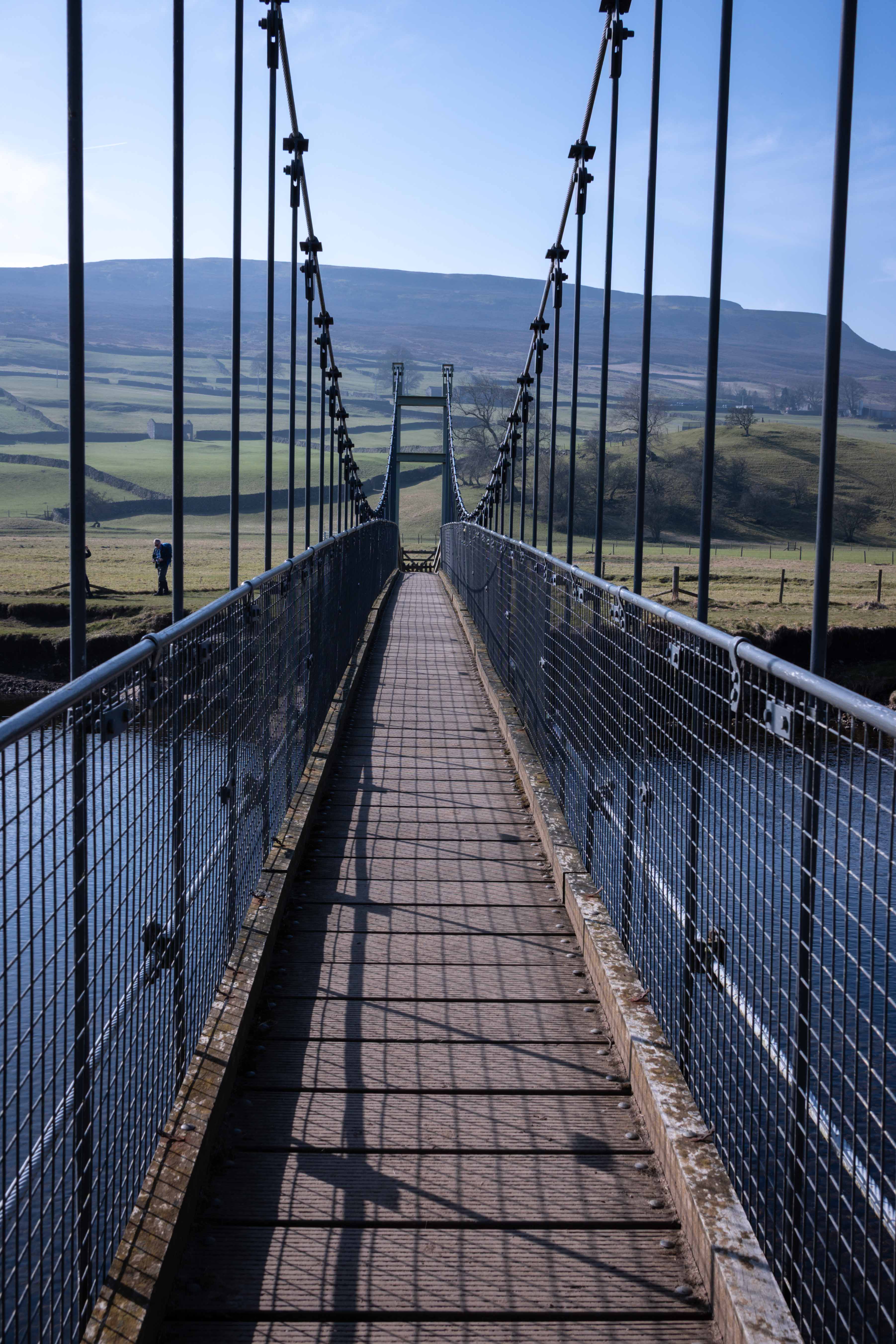 Download wallpaper 3605x5407 bridge, river, shadow, meadows hd background