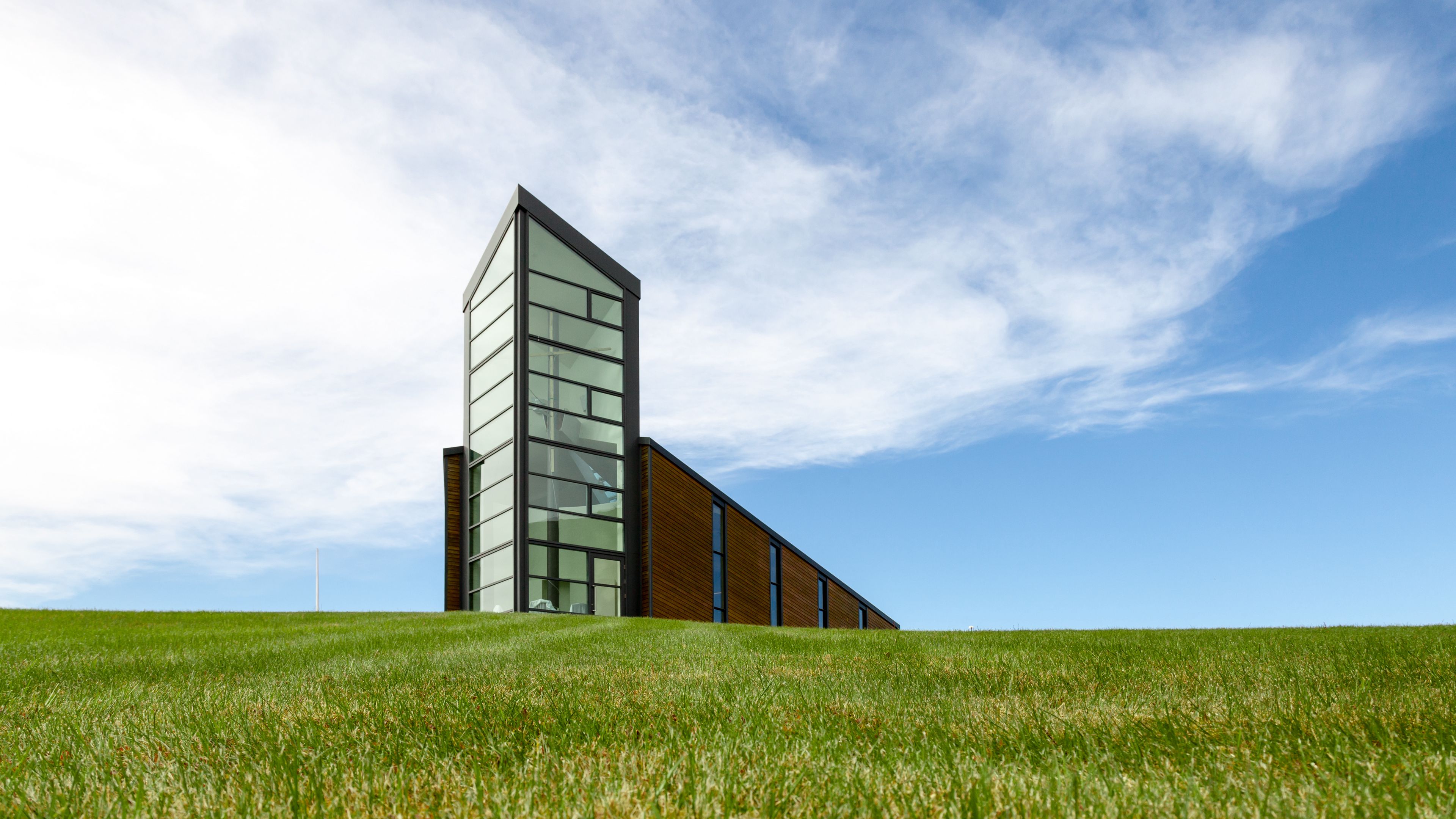 Download wallpaper 3840x2160 building, architecture, field, sky, clouds ...