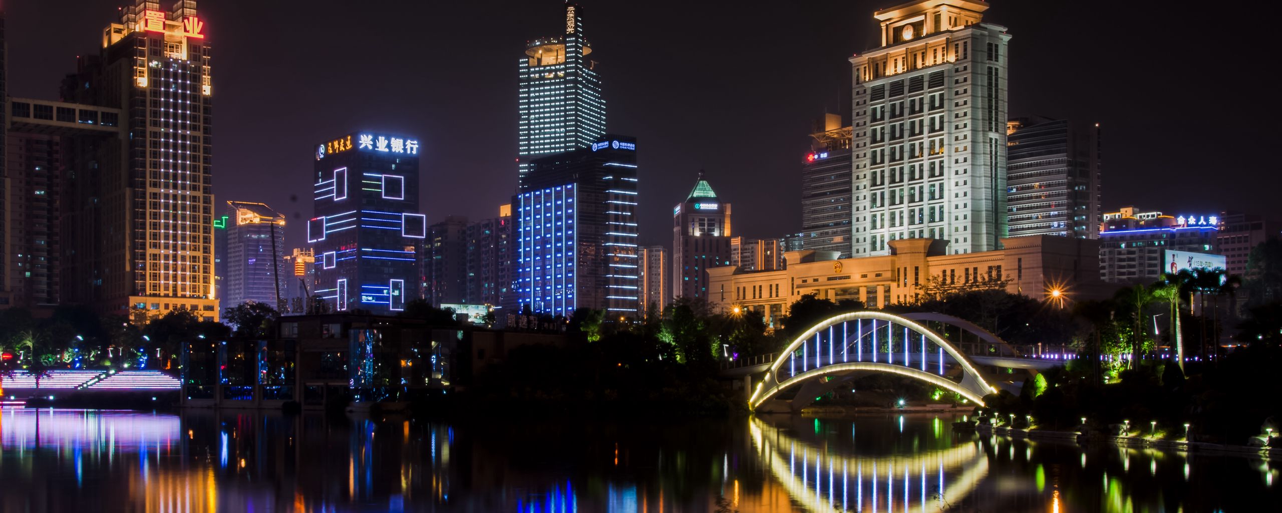 Download wallpaper 2560x1024 building, bridge, lights, water ...