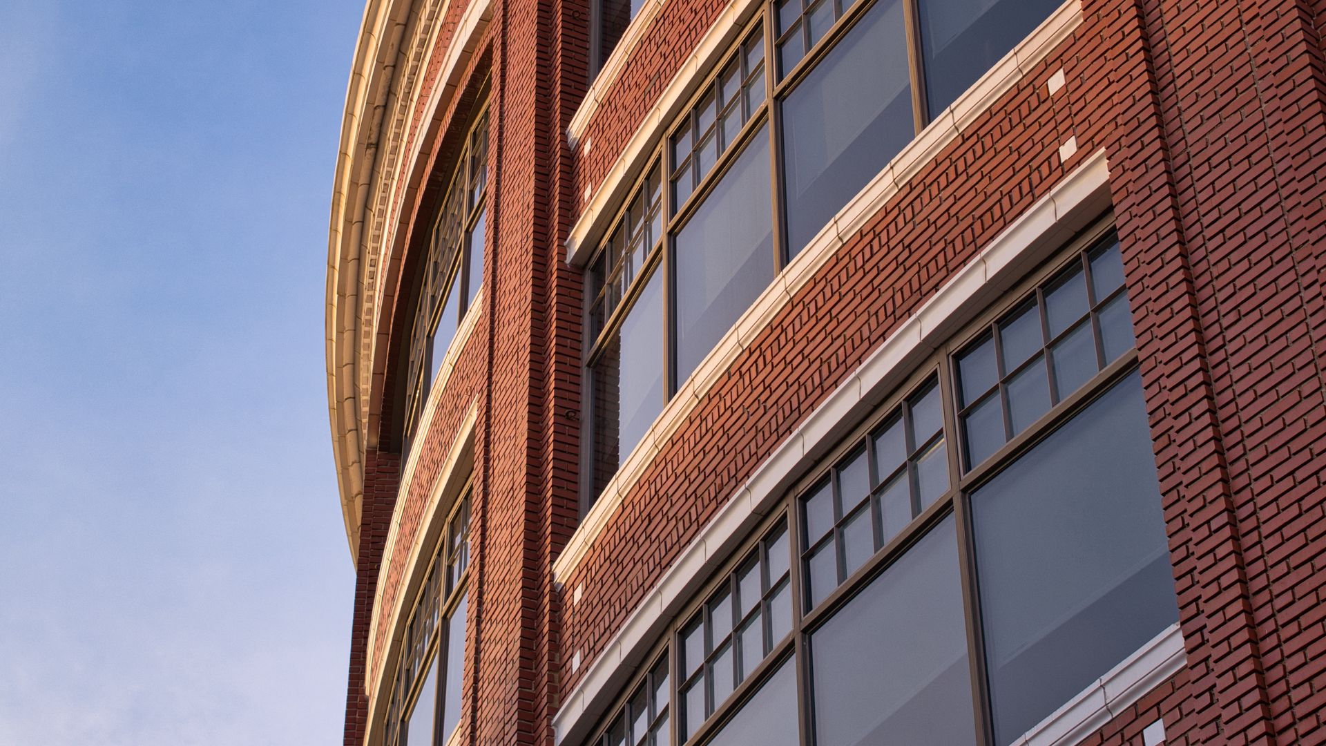 Download wallpaper 1920x1080 building, facade, windows, glass, bricks ...