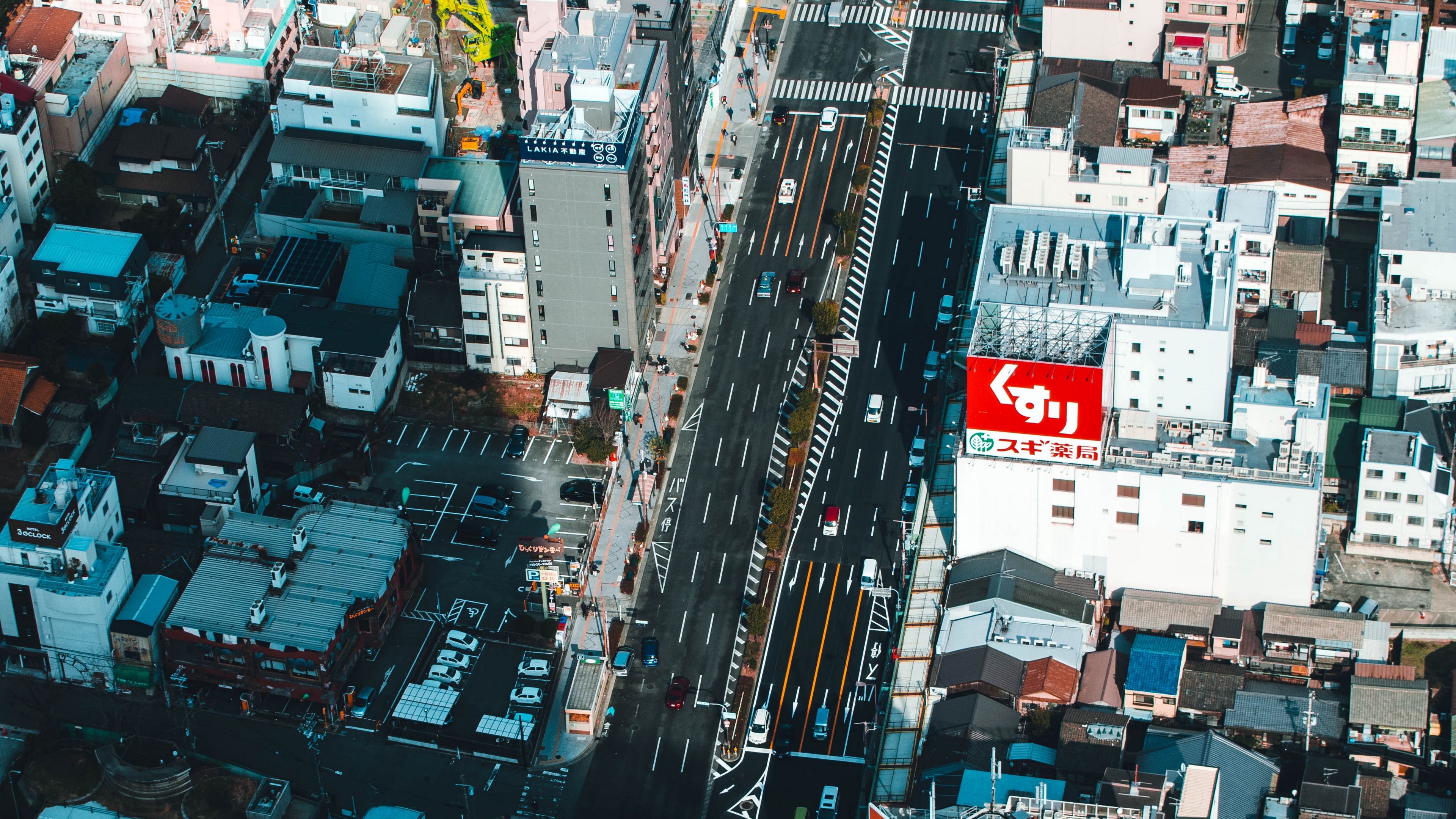 Download wallpaper 3840x2160 buildings, road, aerial view, city ...