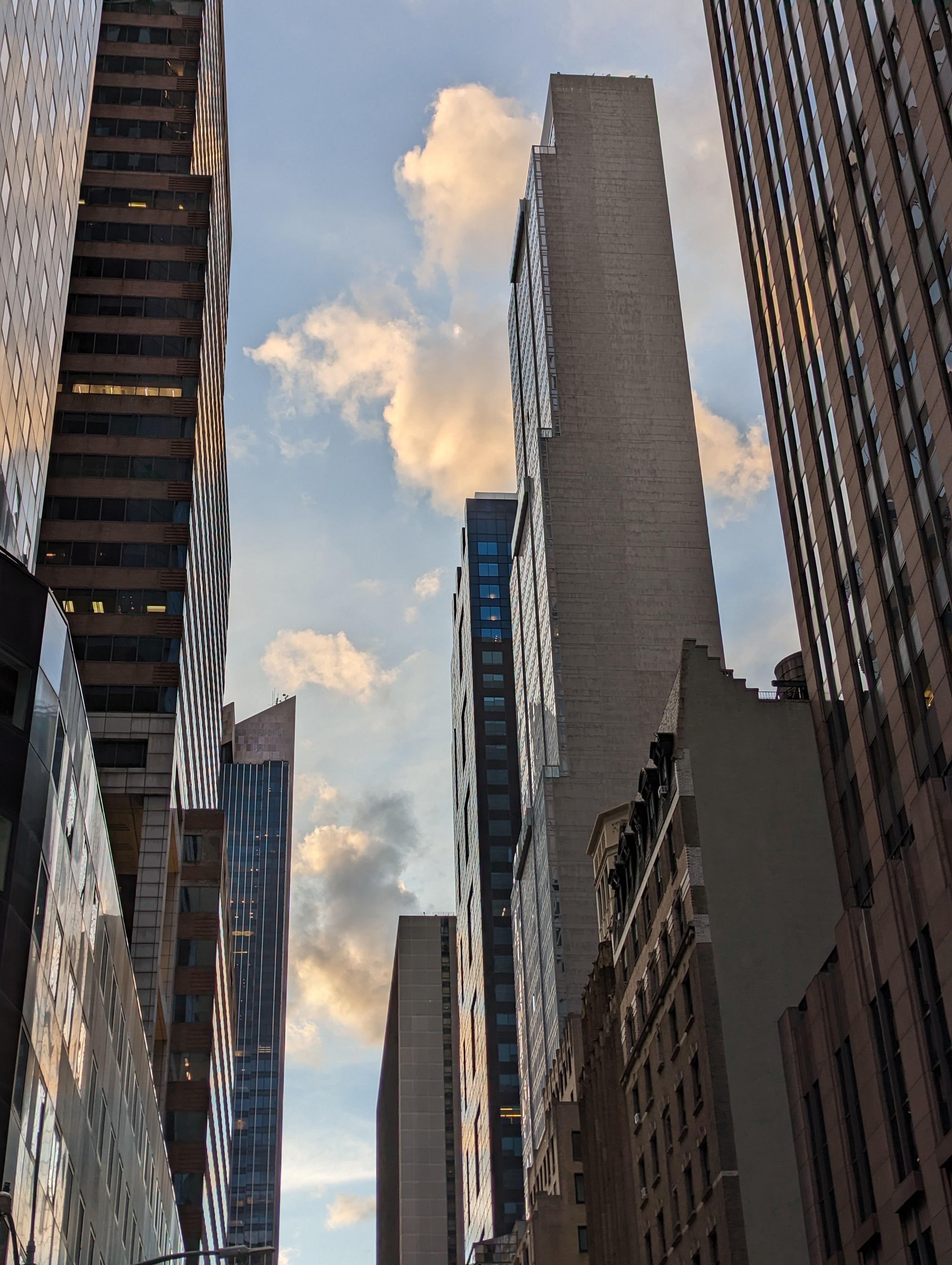 Download wallpaper 3072x4080 buildings, skyscrapers, sky, brown ...