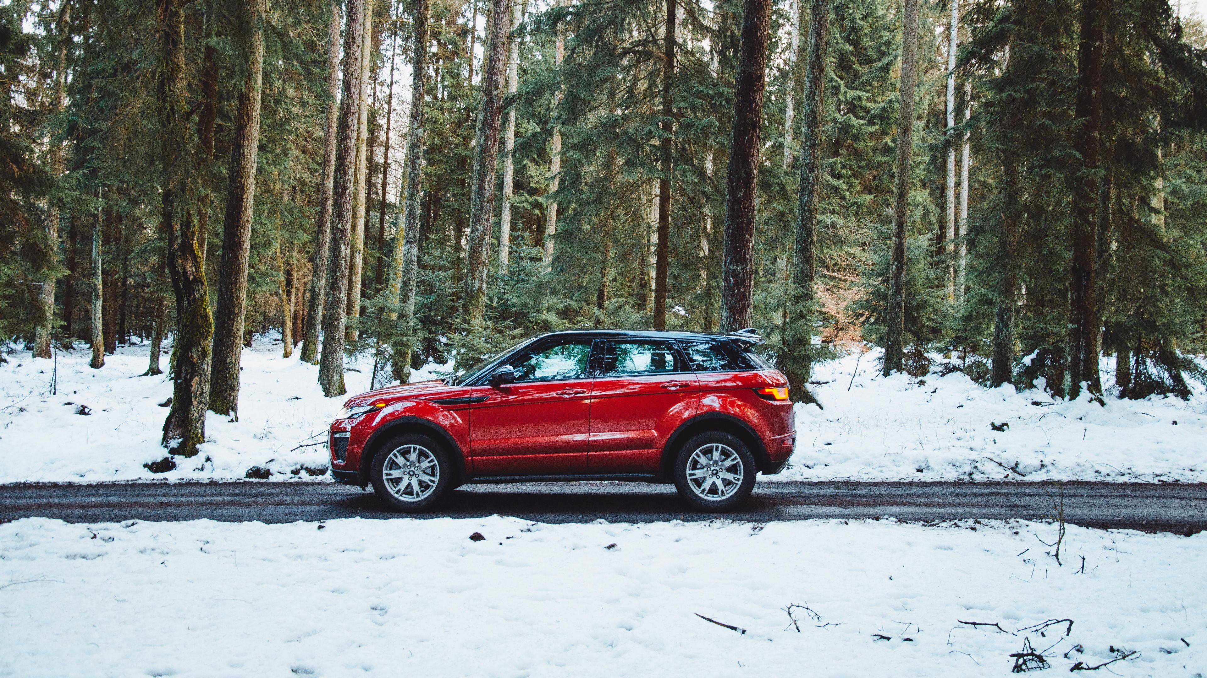 Download wallpaper 3840x2160 car, side view, red, road, forest, snowy ...