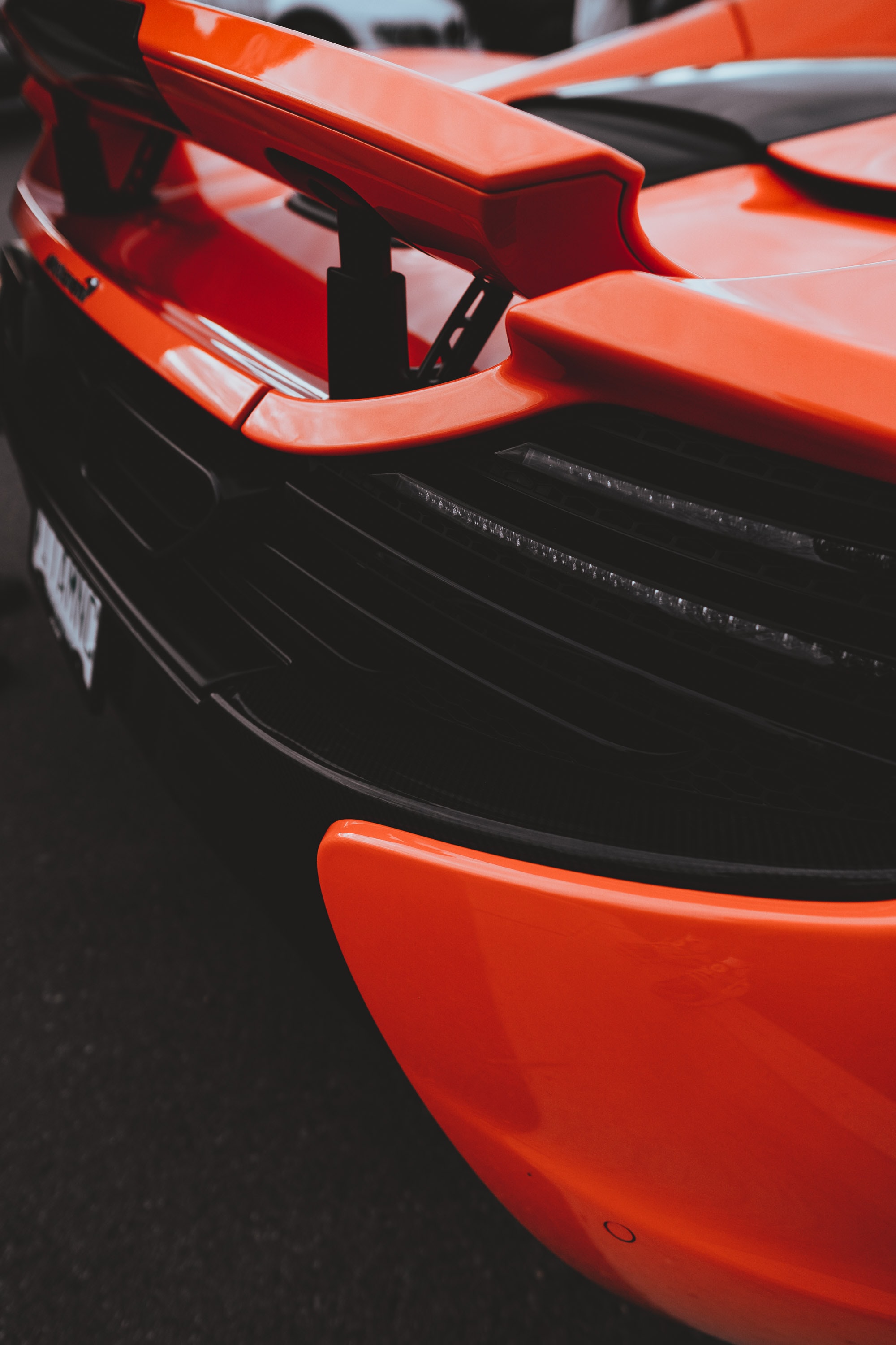 Download wallpaper 2000x3000 car, spoiler, rear view, red hd background