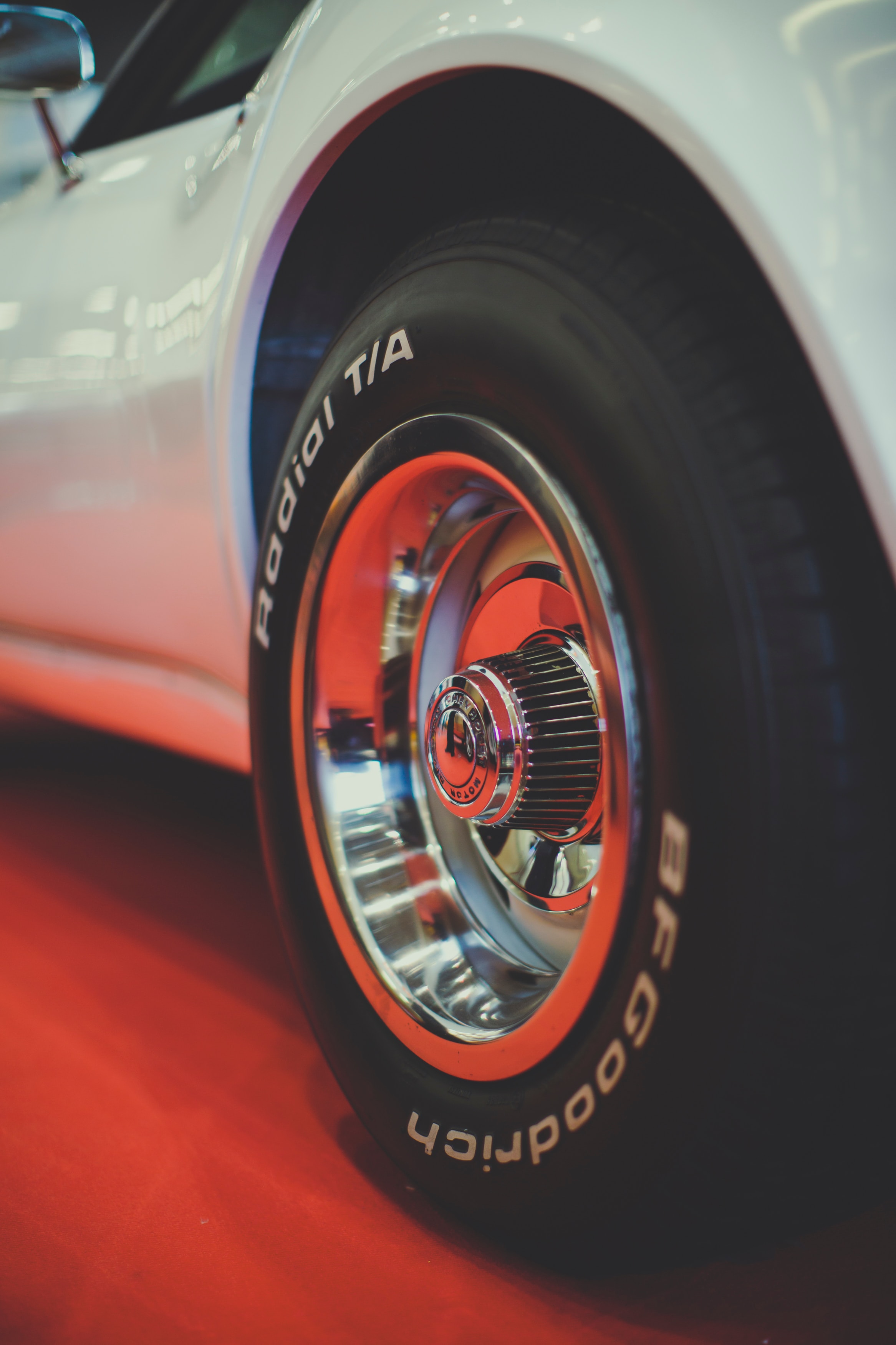 Download wallpaper 2333x3500 car, wheel, disk, chrome hd background