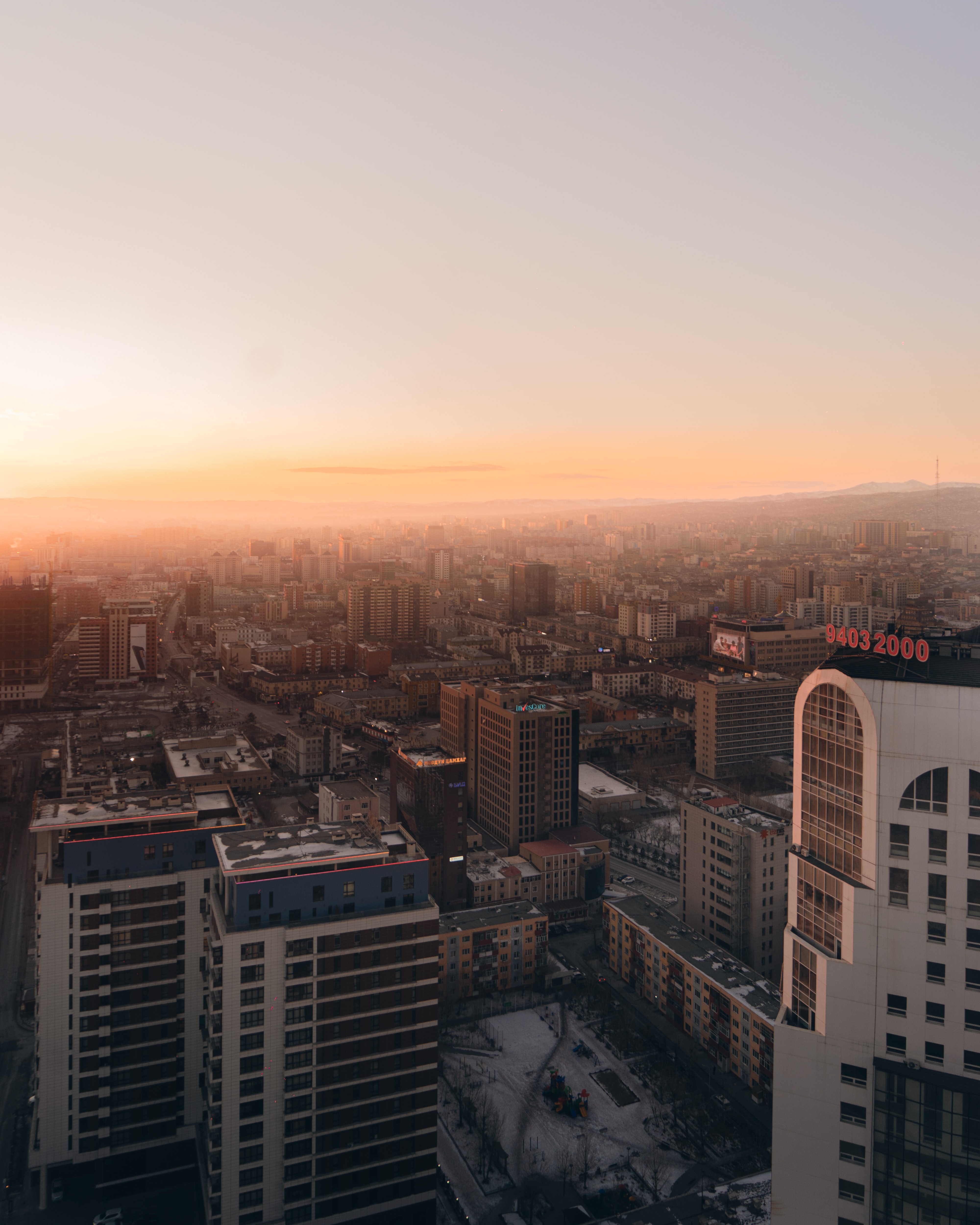 Download wallpaper 4000x5000 city, buildings, aerial view, horizon, fog ...