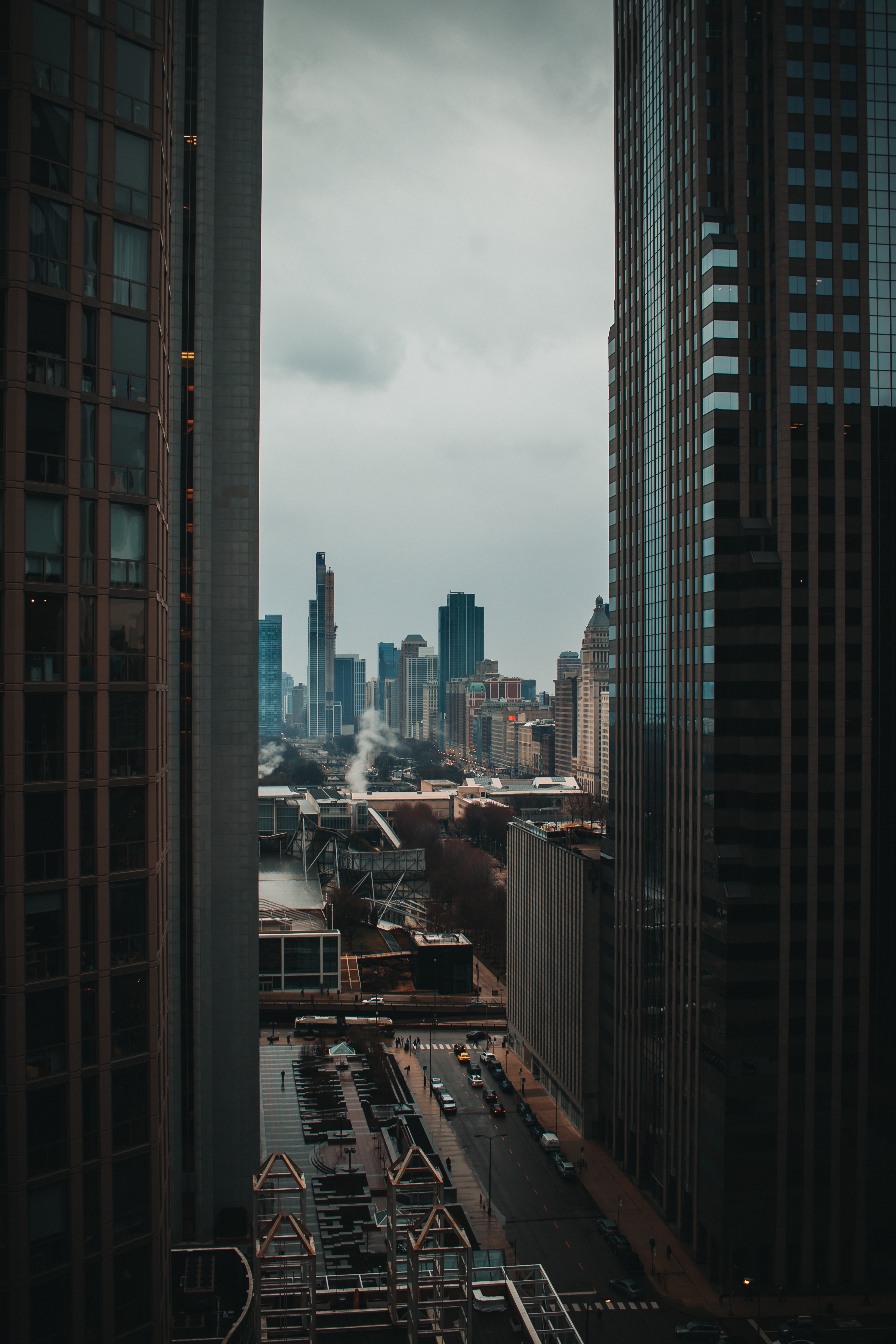 Download wallpaper 4000x6000 city, buildings, aerial view, road hd ...