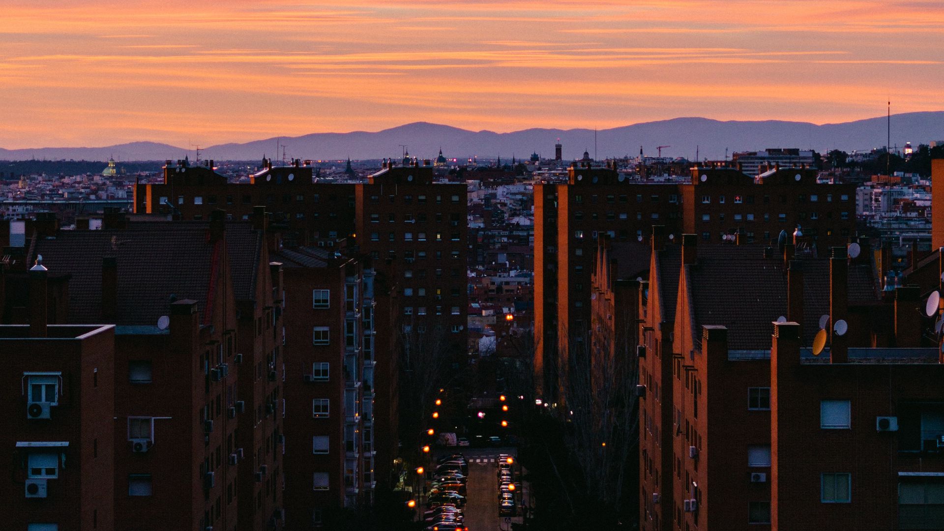 Download wallpaper 1920x1080 city, road, aerial view, buildings, sunset ...