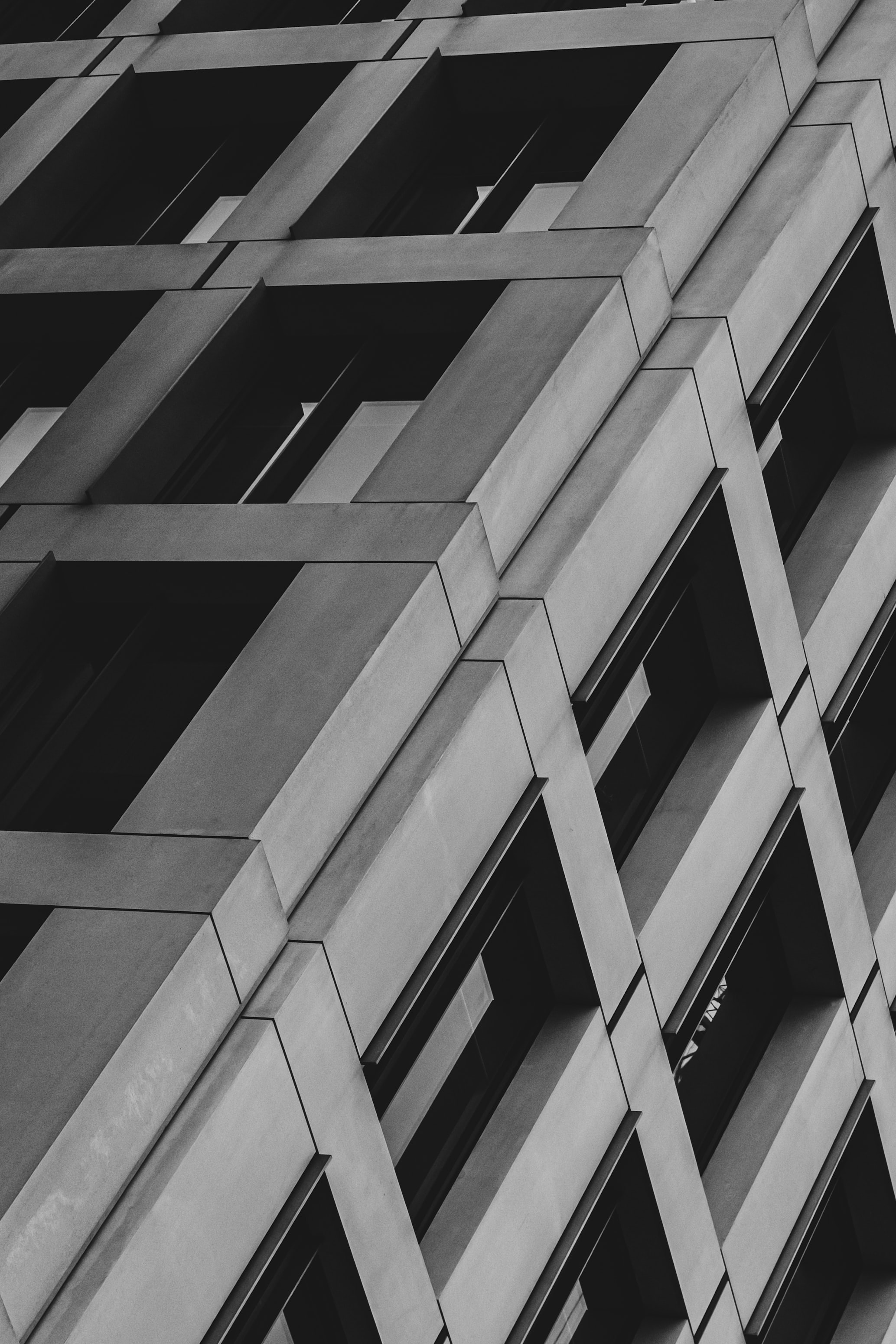 Download wallpaper 2067x3100 facade, building, bw, wall hd background