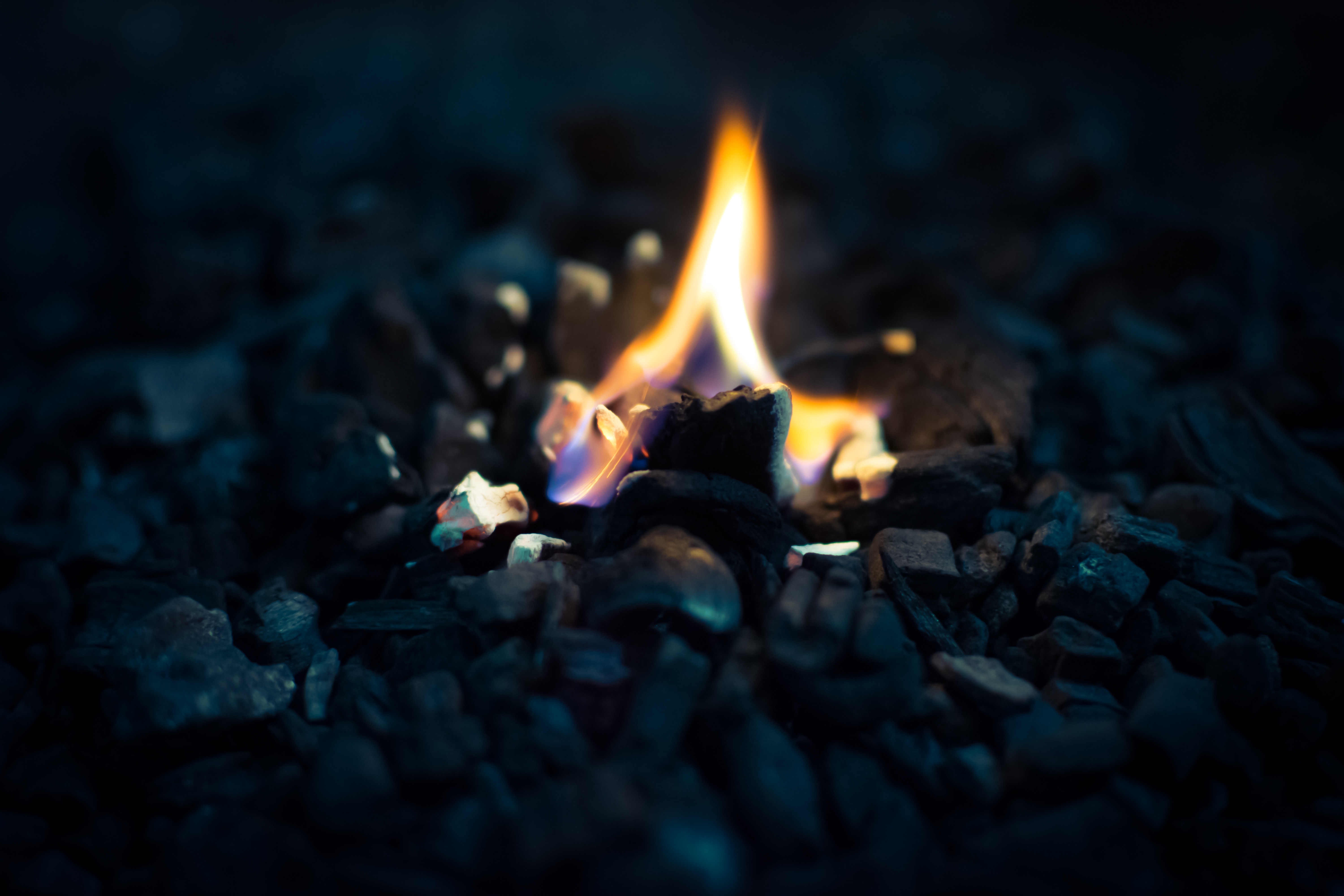 Download wallpaper 6000x4000 fire, flame, stones, macro, dark hd background
