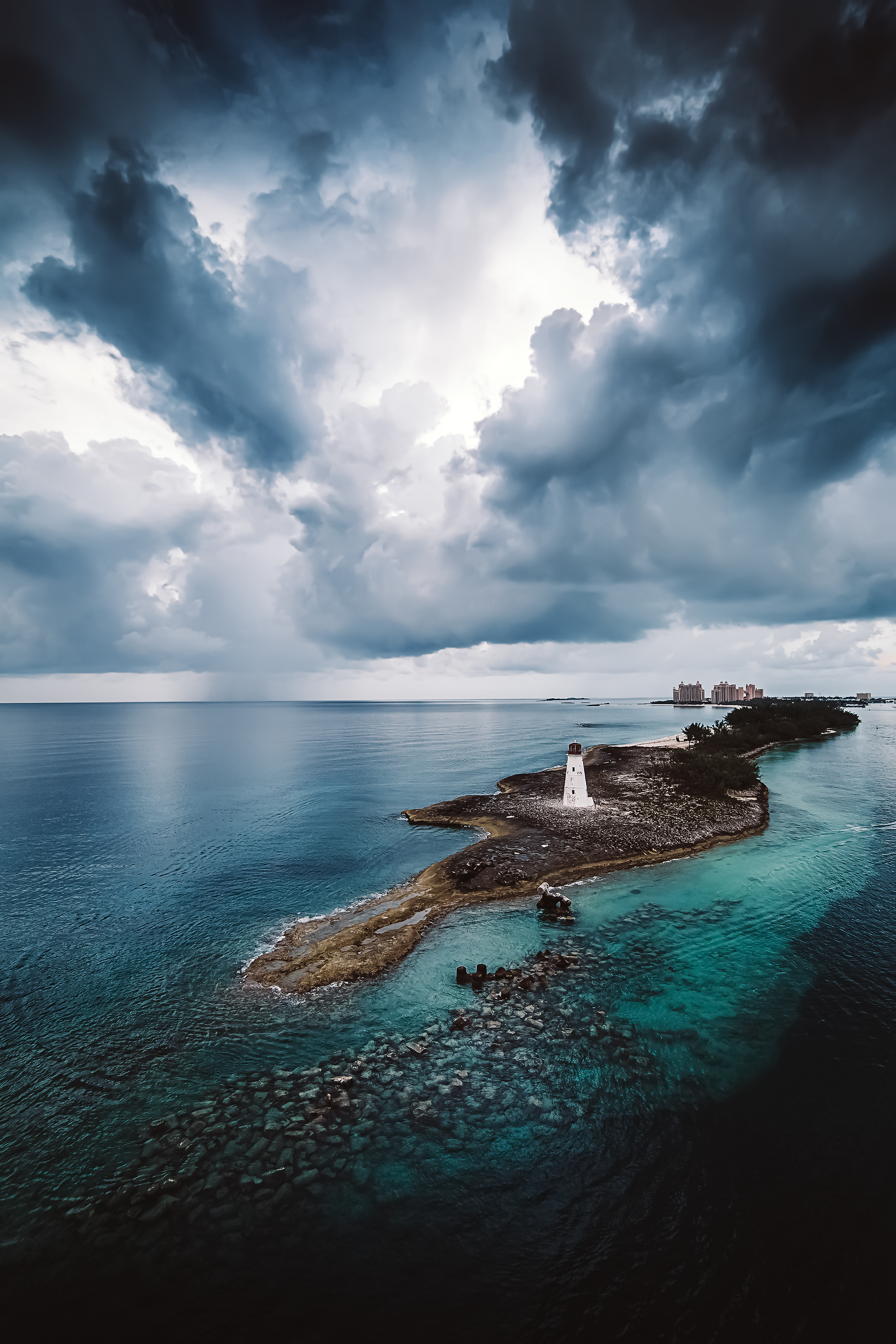 Download wallpaper 2000x3000 island, lighthouse, sea, clouds, landscape ...