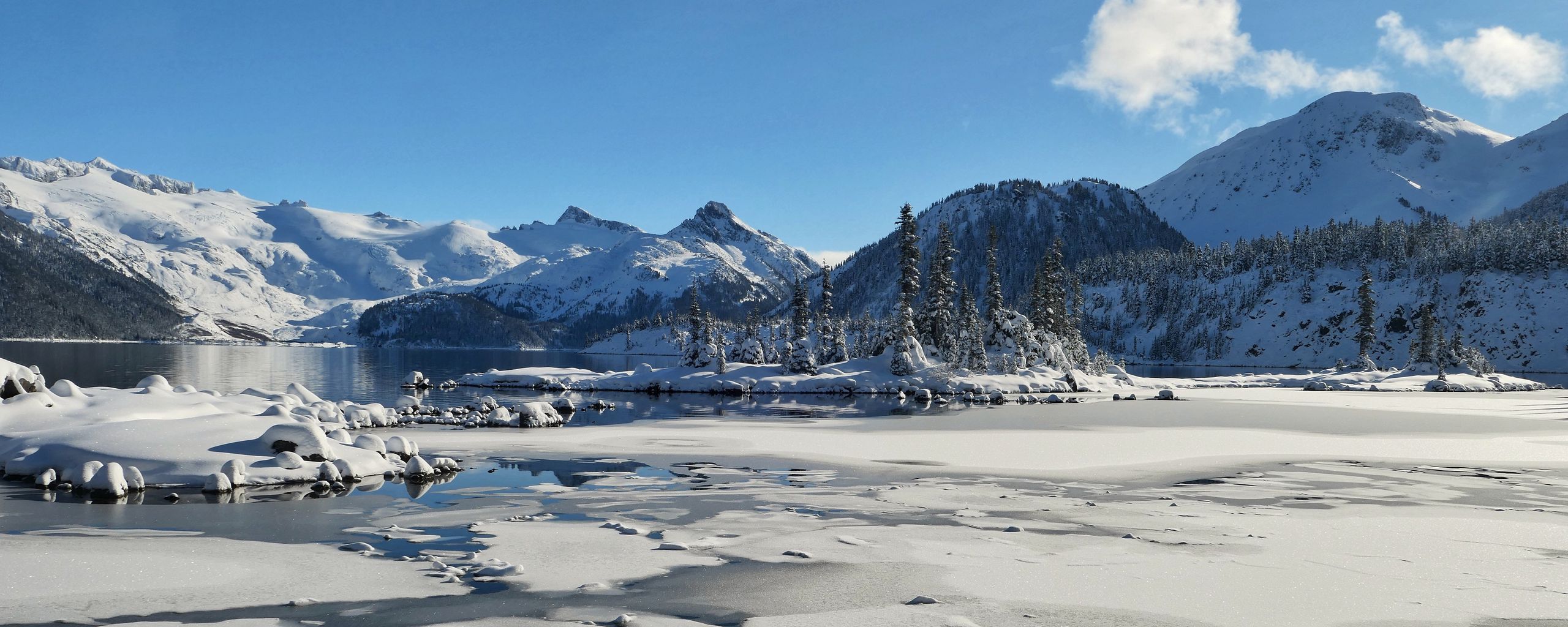 Download wallpaper 2560x1024 lake, mountains, ice, snow, winter ...