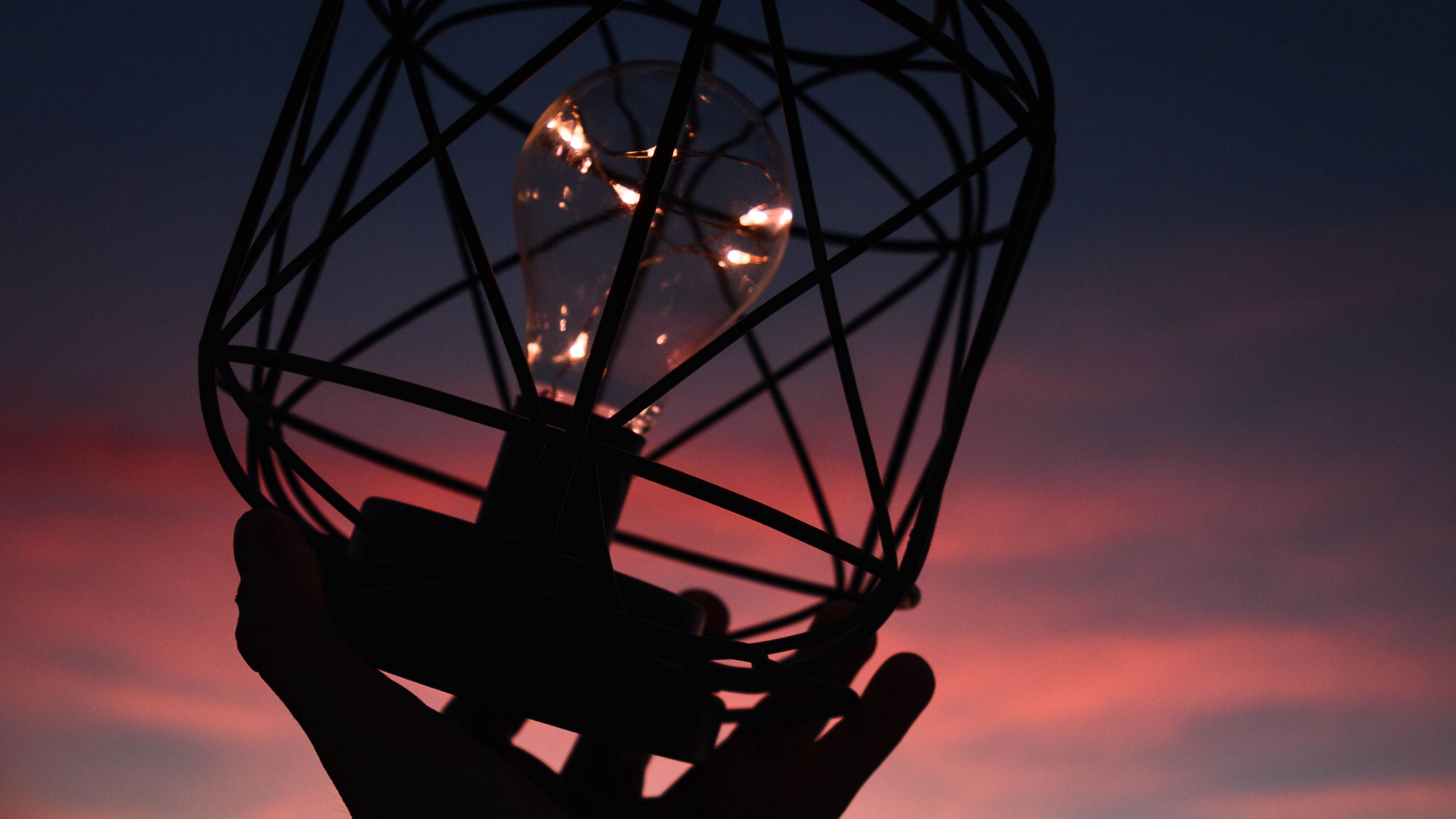 Download wallpaper 3840x2160 light bulb, lantern, hand, dark, dusk 4k ...