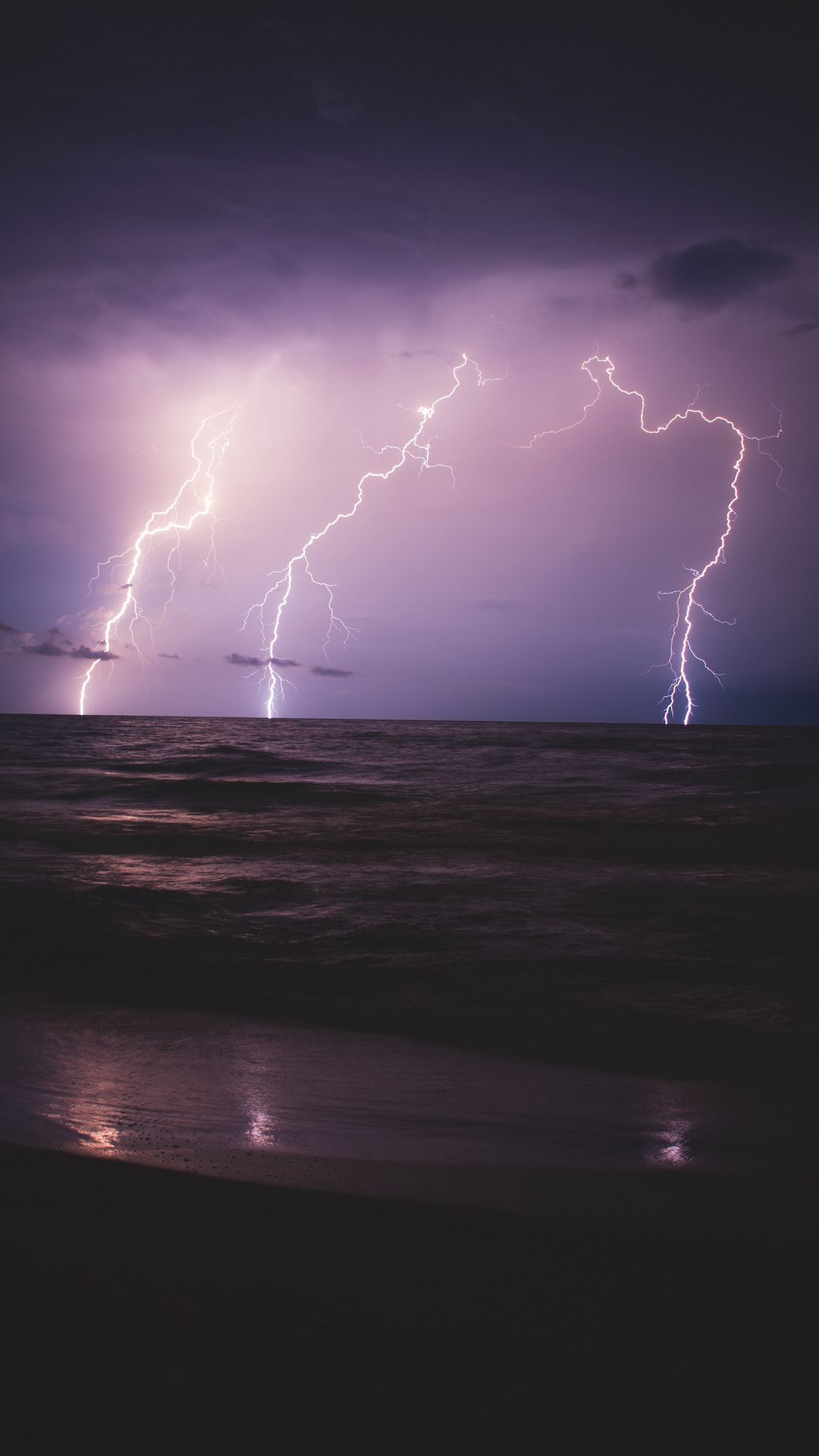 Download wallpaper 1080x1920 lightning, sea, horizon, night, overcast ...