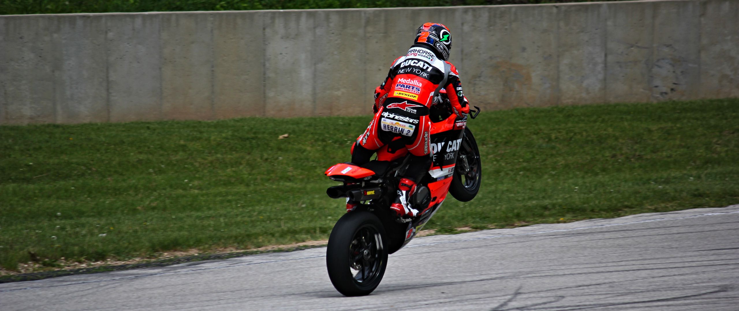Download wallpaper 2560x1080 motorcyclist, motorcycle, red, motorcycle ...