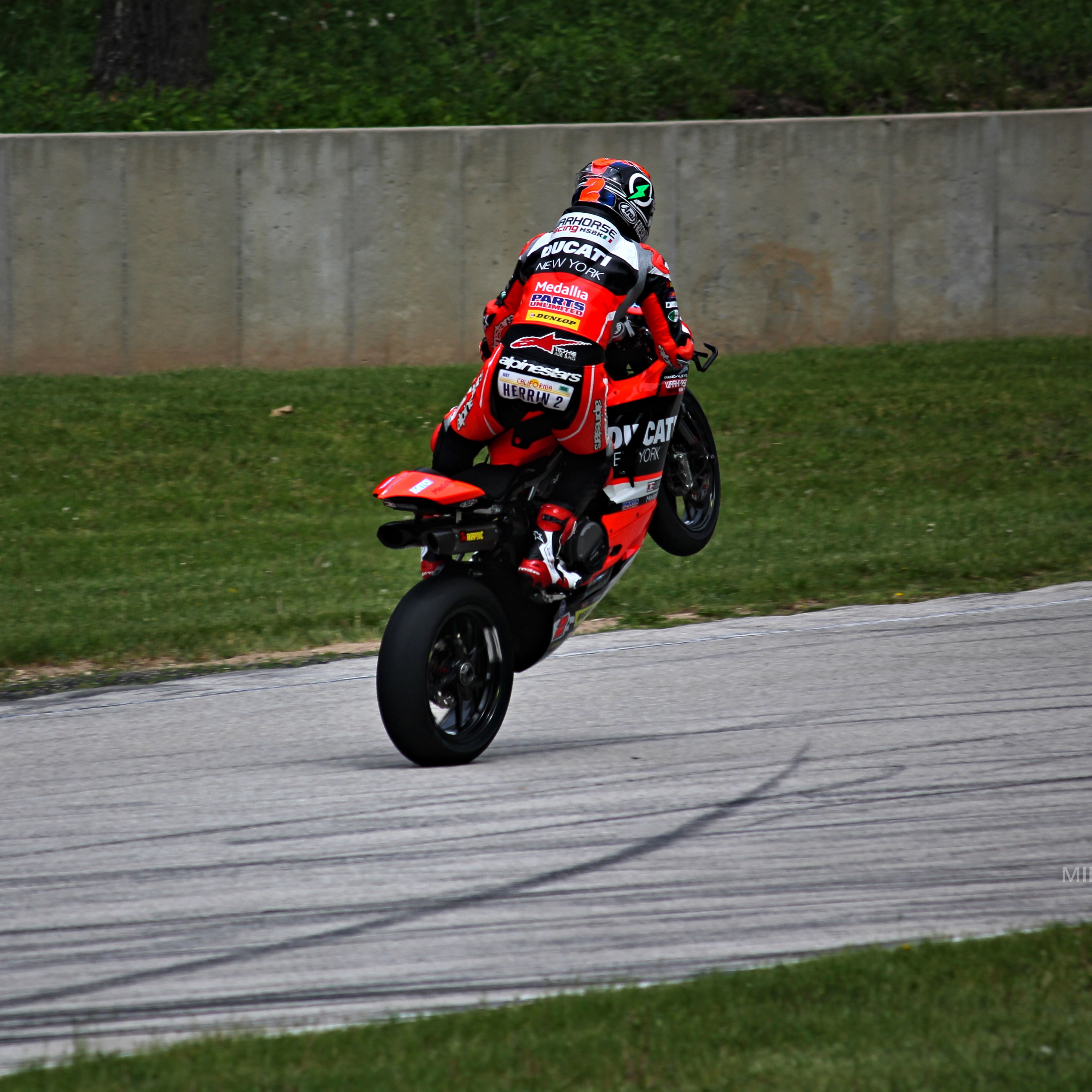 Download wallpaper 3415x3415 motorcyclist, motorcycle, red, motorcycle ...