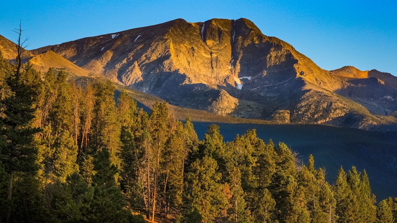 Download wallpaper 1366x768 mountain, trees, slope, light, landscape ...