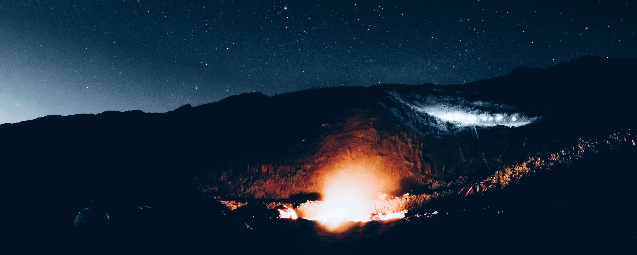 Download wallpaper 2560x1024 mountains, starry sky, night, light ...
