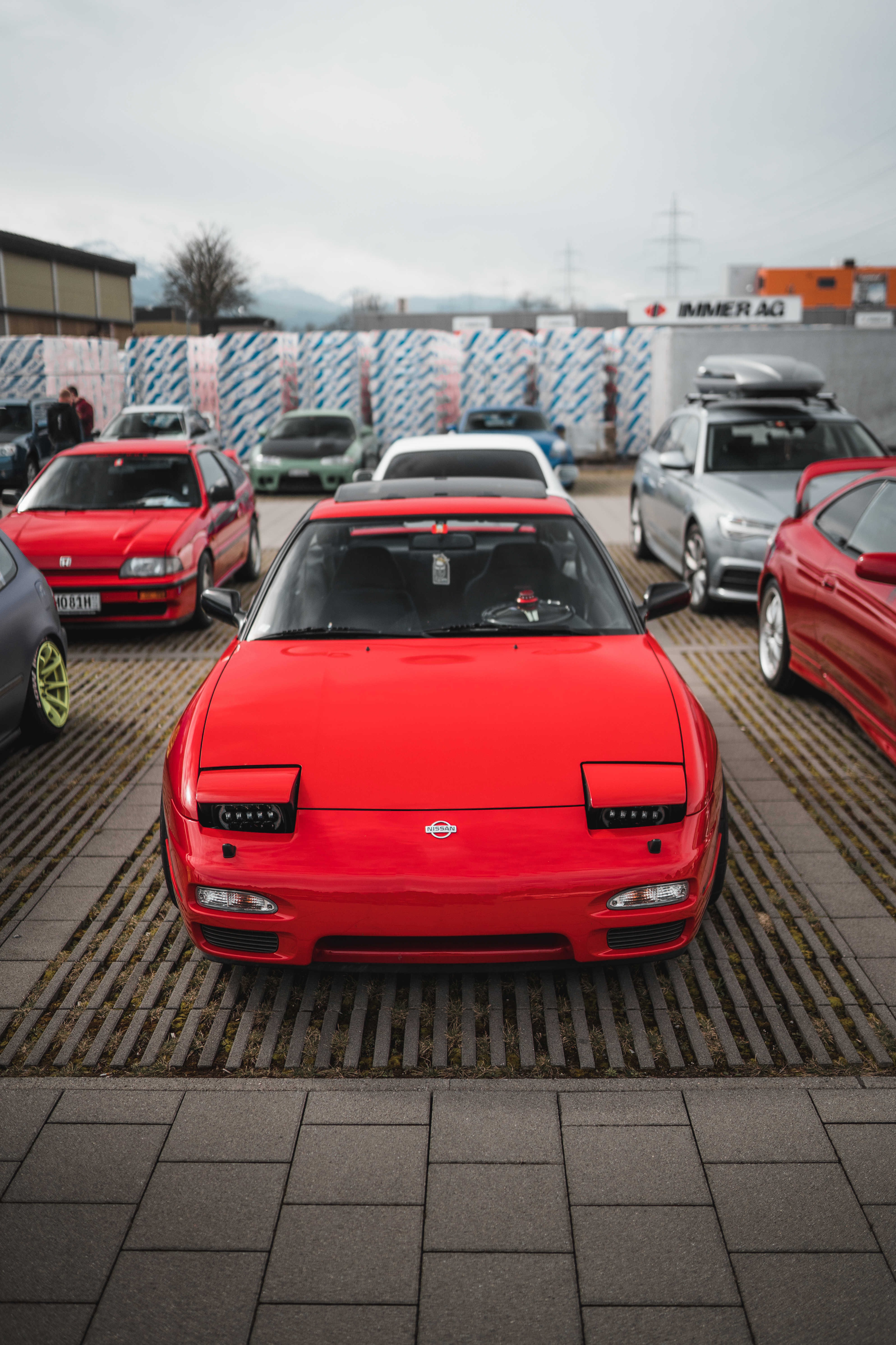 Download wallpaper 3973x5960 nissan, car, front view, red hd background