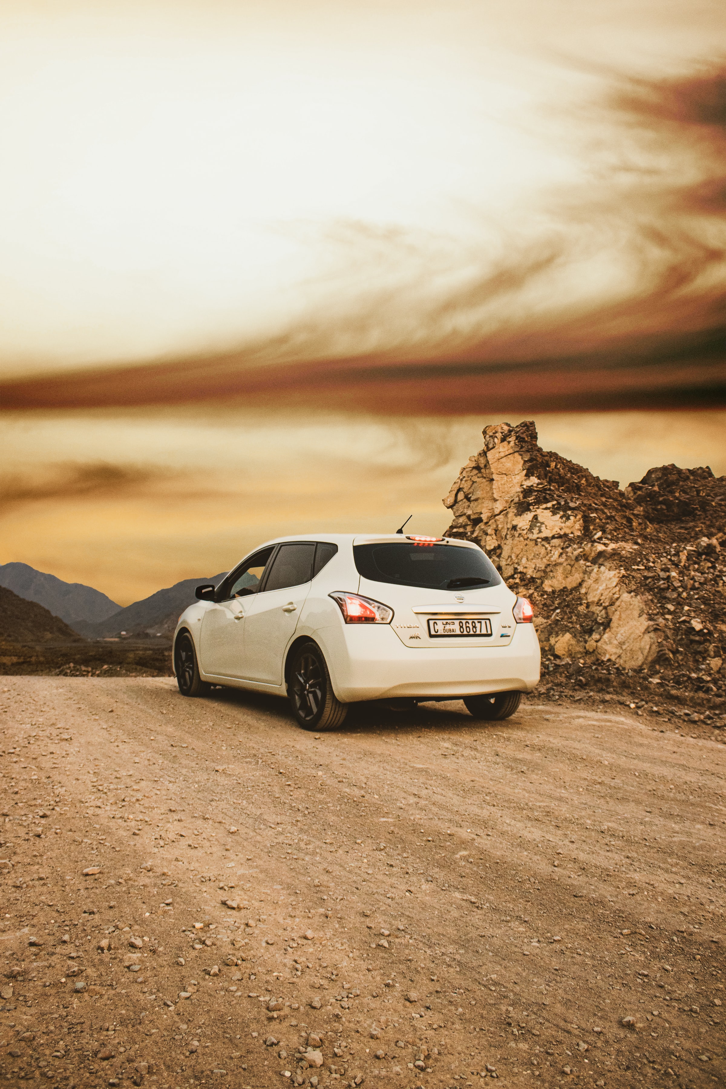 Download wallpaper 2400x3600 nissan tiida, nissan, car, rear view ...