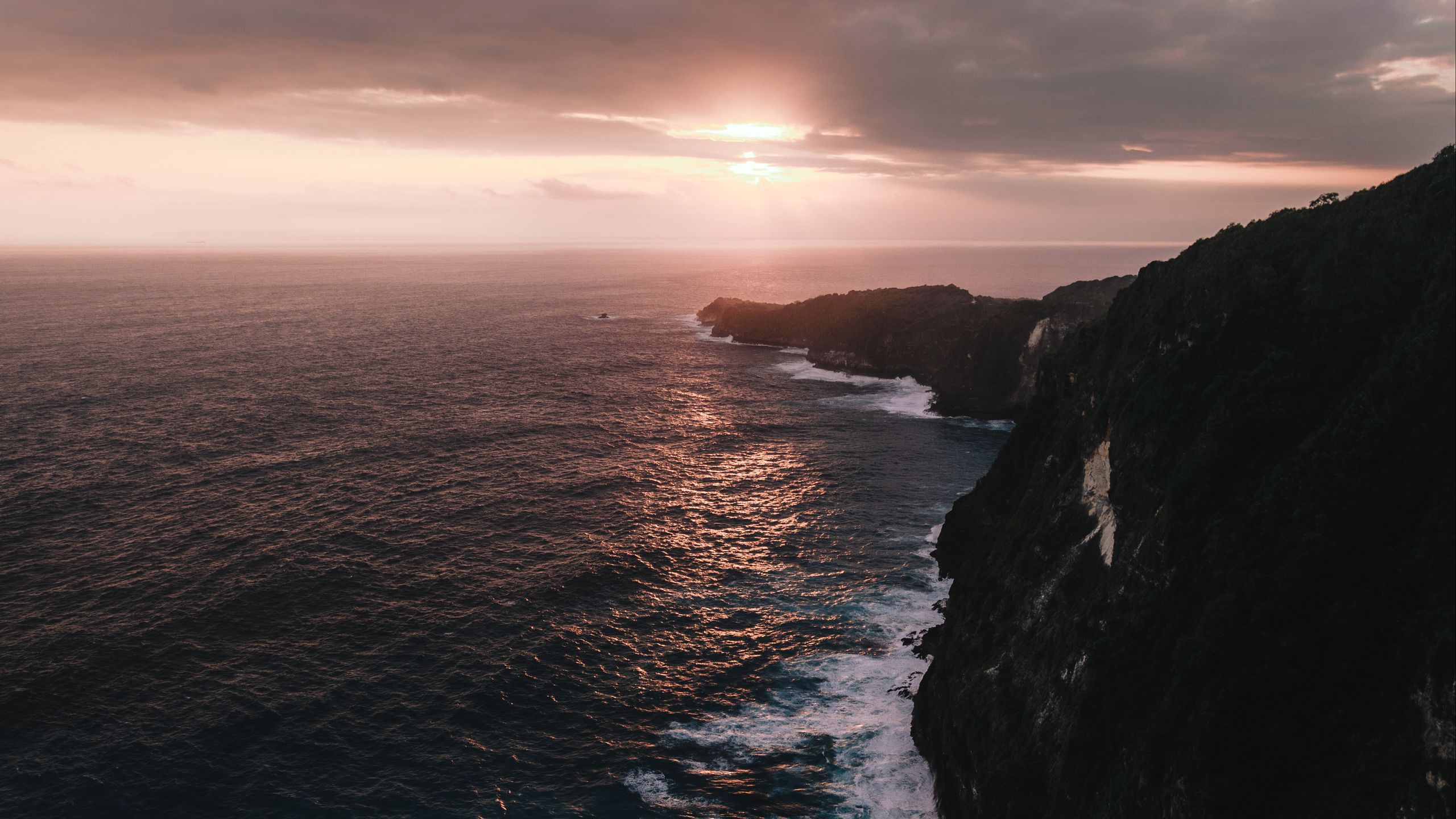 Download wallpaper 2560x1440 ocean, island, sunset, indonesia ...