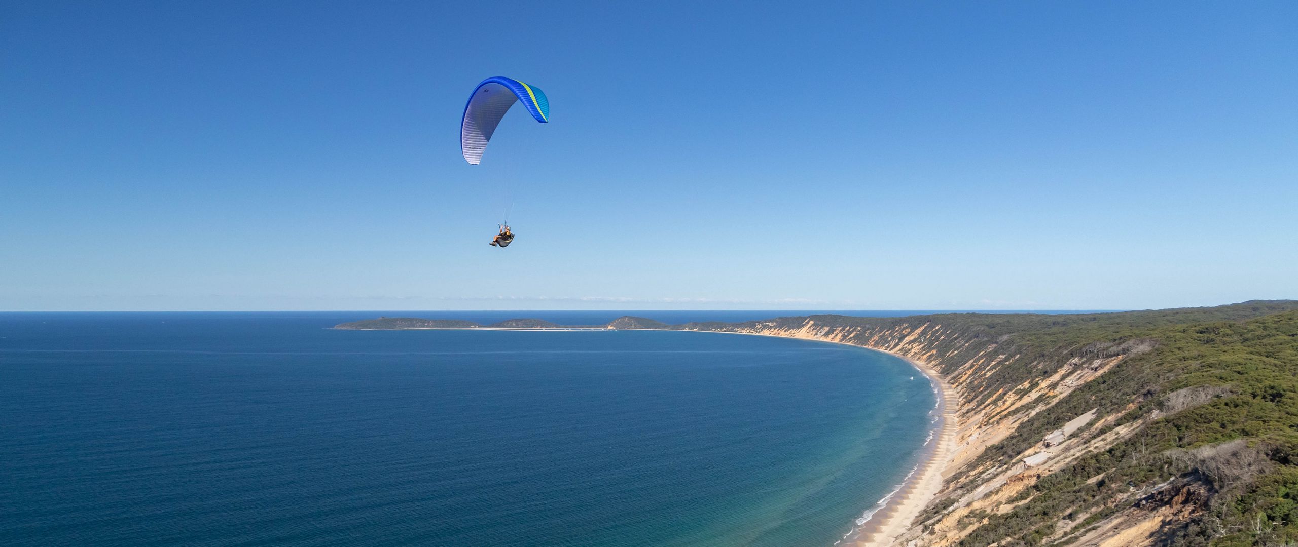 Download wallpaper 2560x1080 parachute, parachutist, jump, sea, extreme ...
