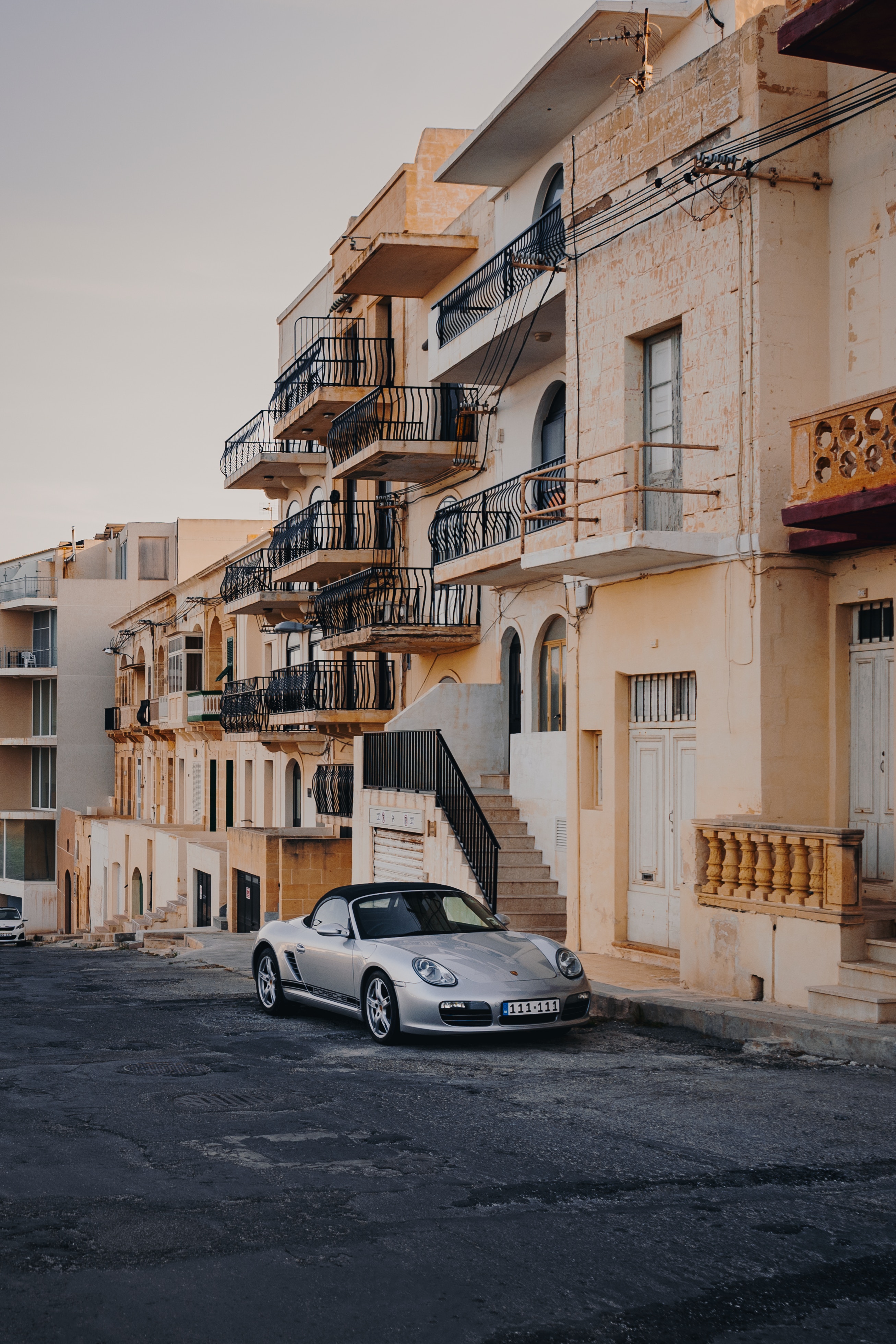 Download wallpaper 2613x3918 porsche, sports car, building, facade ...