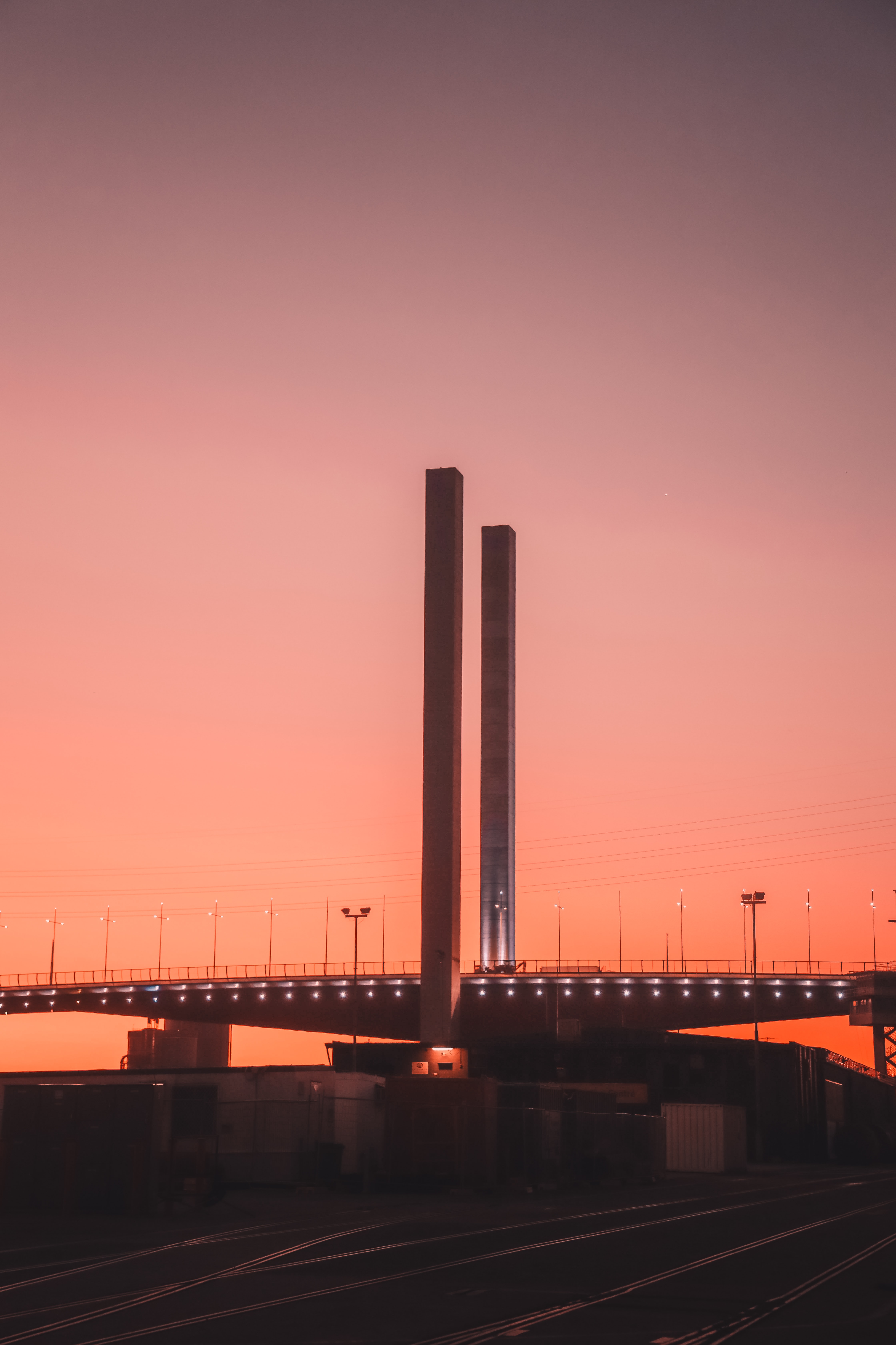 Download wallpaper 4480x6720 road, bridge, construction, dusk hd background