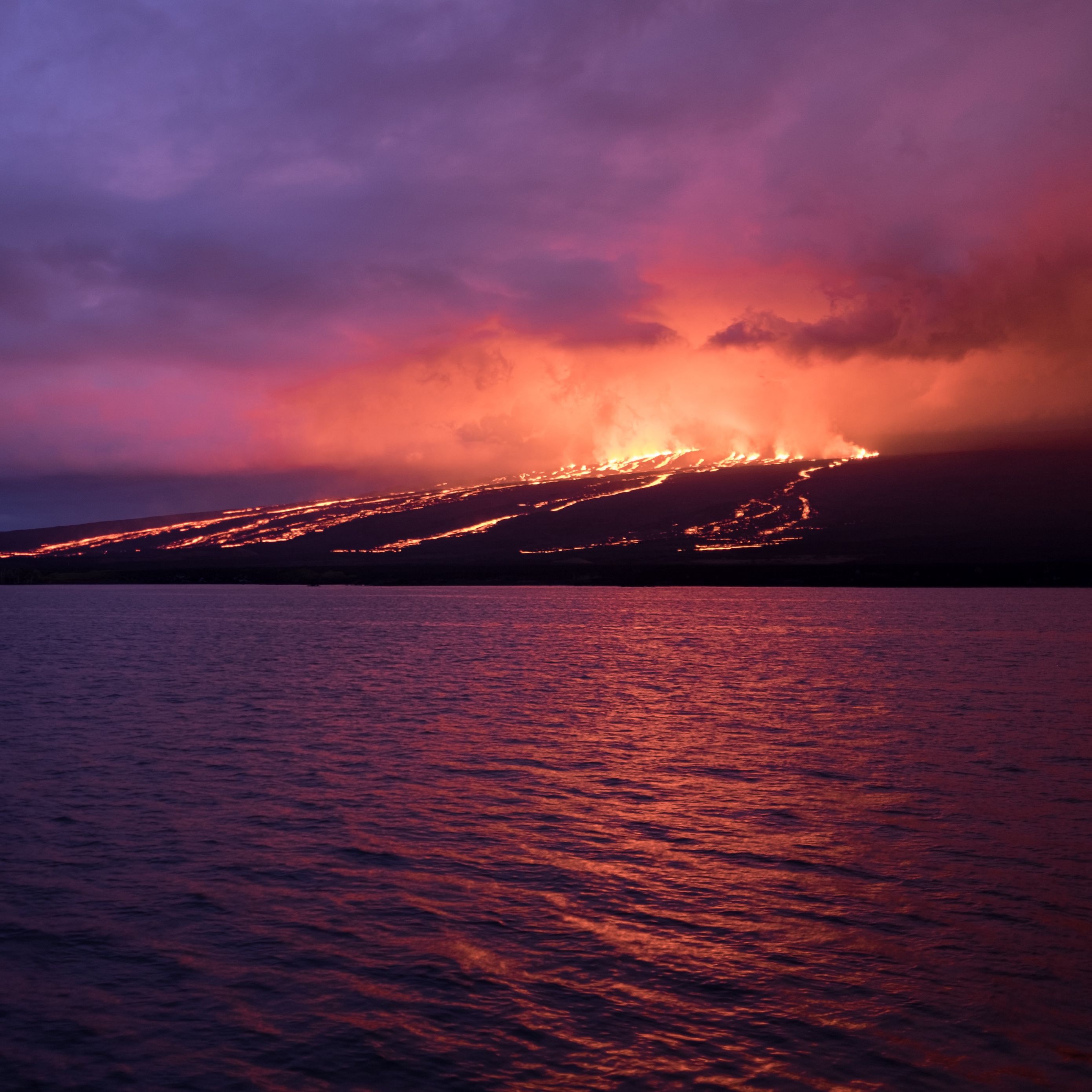 Download wallpaper 2780x2780 sea, island, volcano, lava, fire, night ...