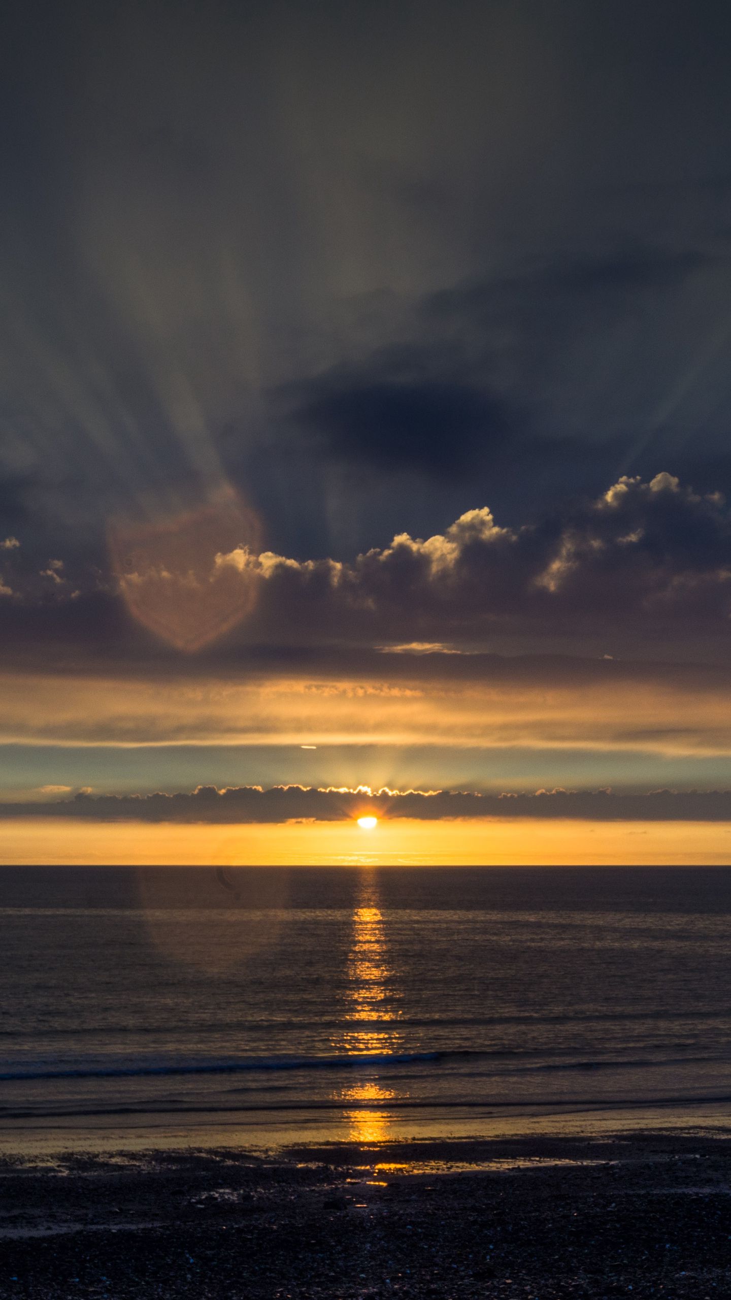 Download wallpaper 1440x2560 sea, sunset, horizon, sky, water, clouds ...