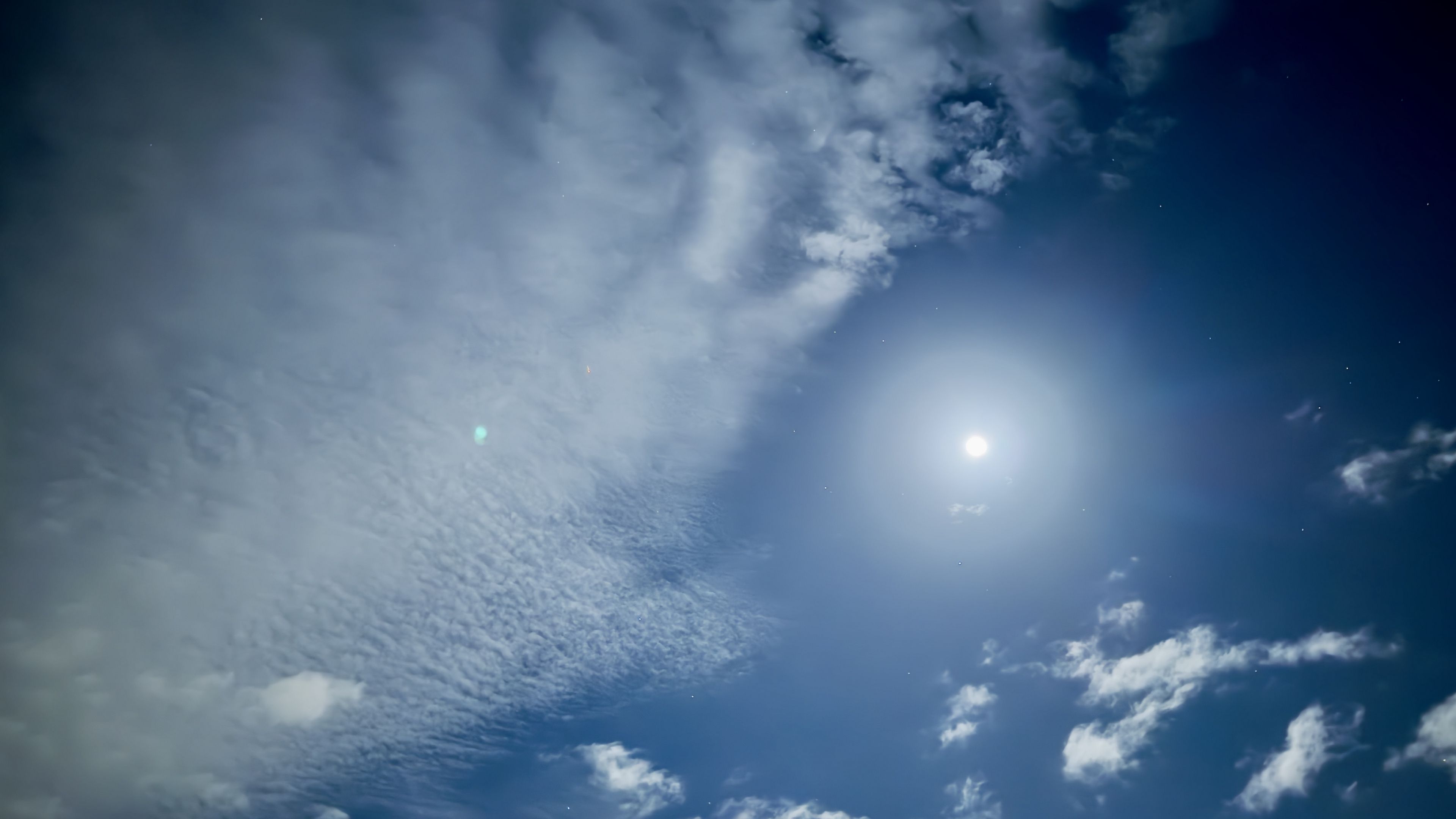 Download wallpaper 3840x2160 sky, clouds, blue, halo, sun 4k uhd 16:9 hd background