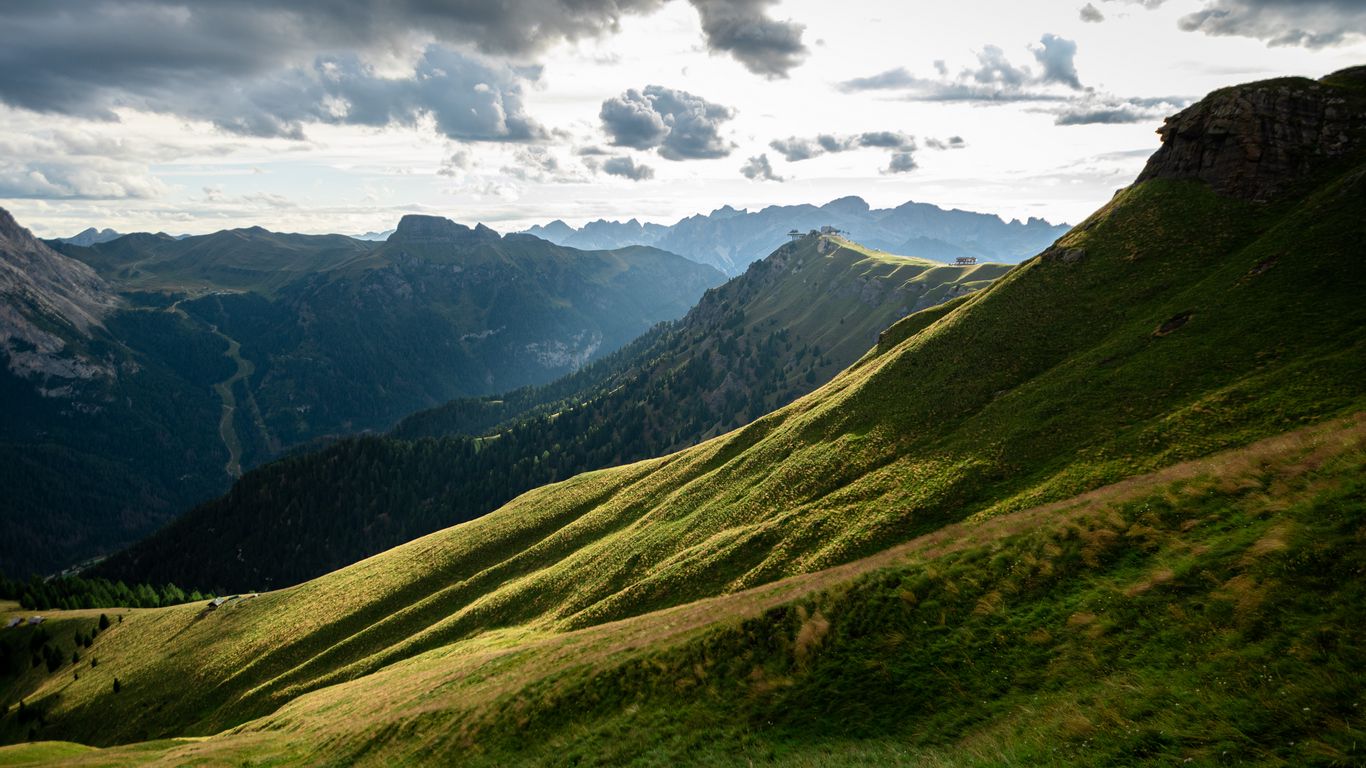 Download wallpaper 1366x768 slopes, mountains, grass, trees, landscape ...