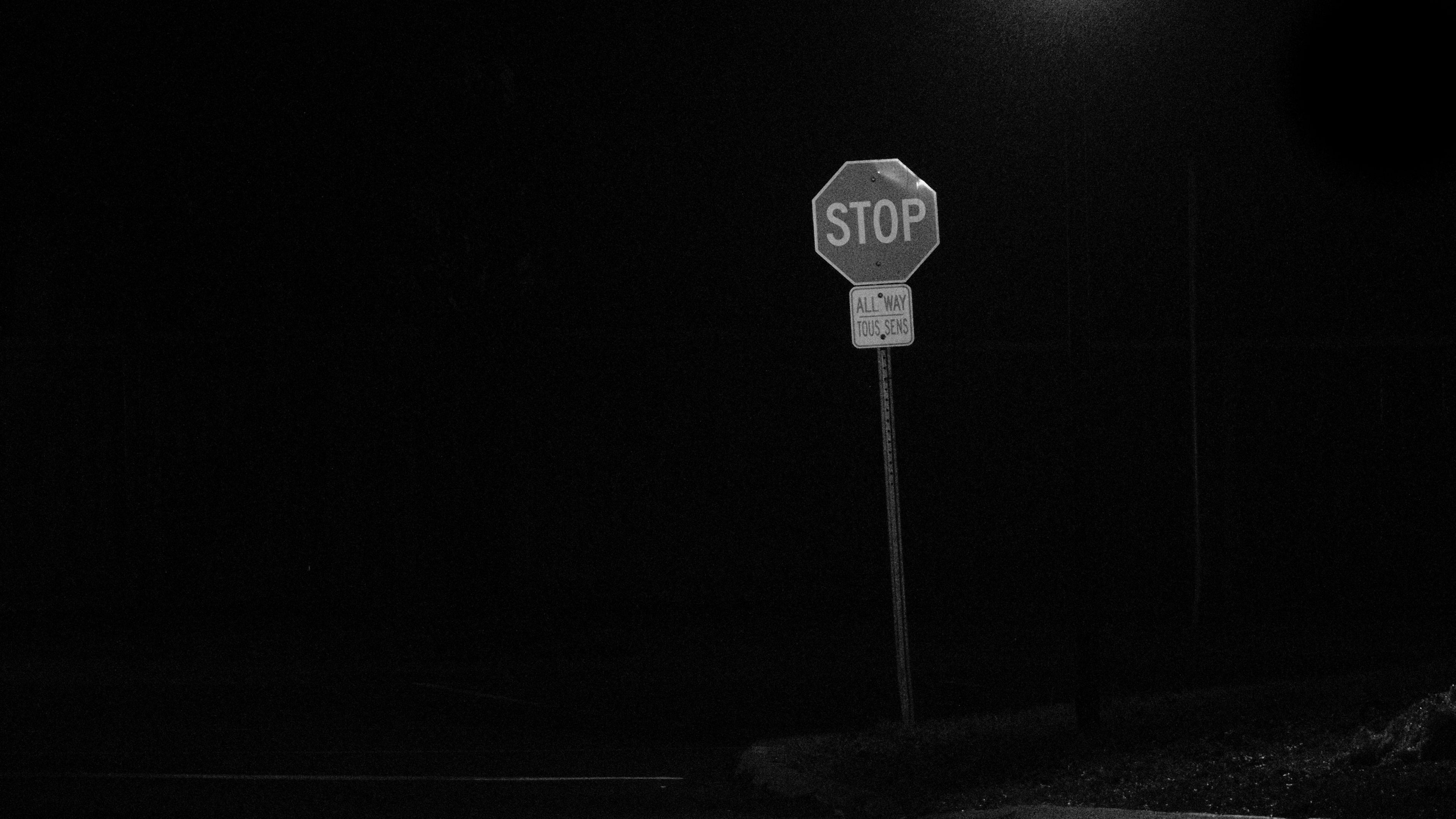 Download wallpaper 3840x2160 stop, sign, road, night, black and white ...