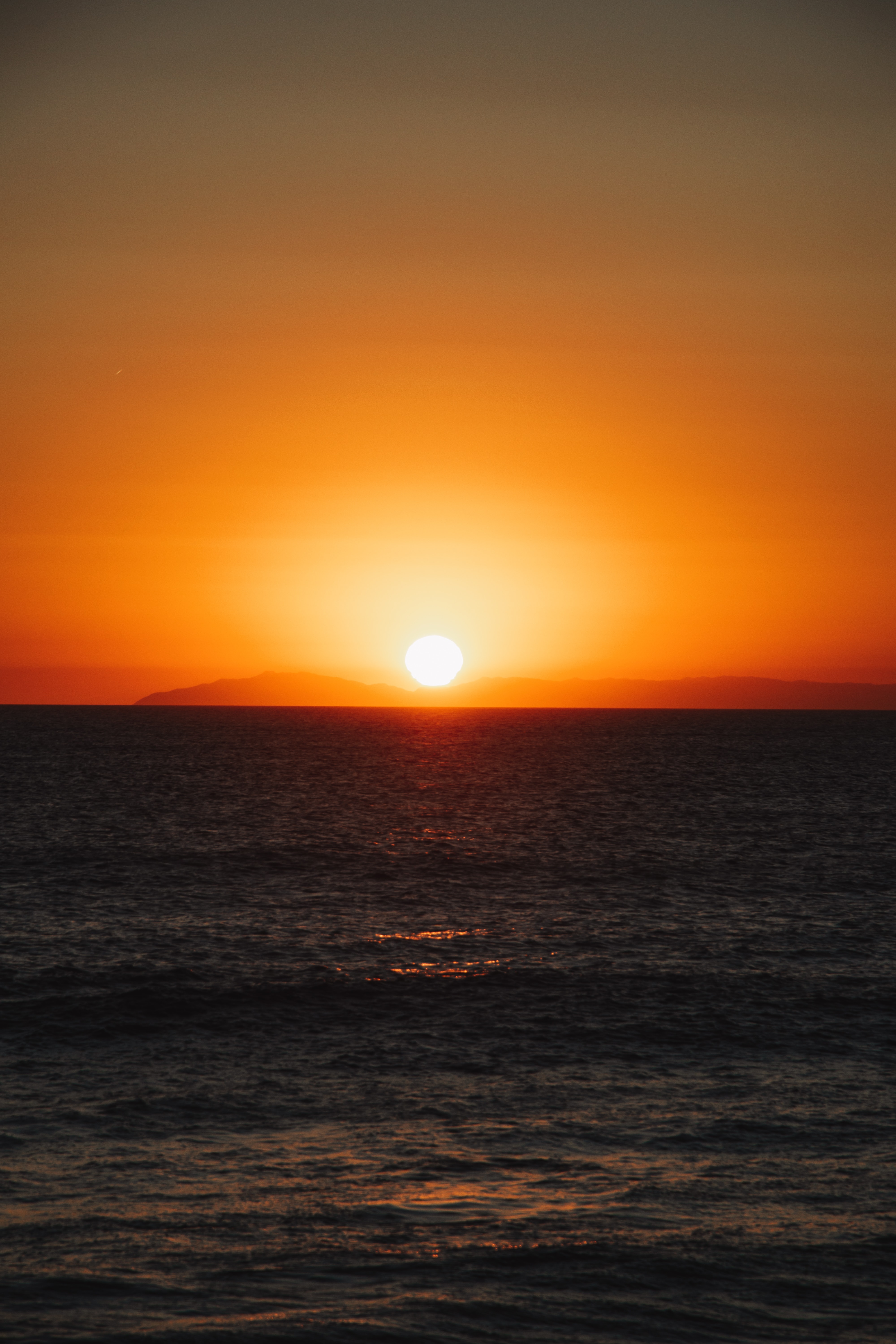 Download wallpaper 4000x6000 sun, sunset, sea, horizon, waves, glare hd ...