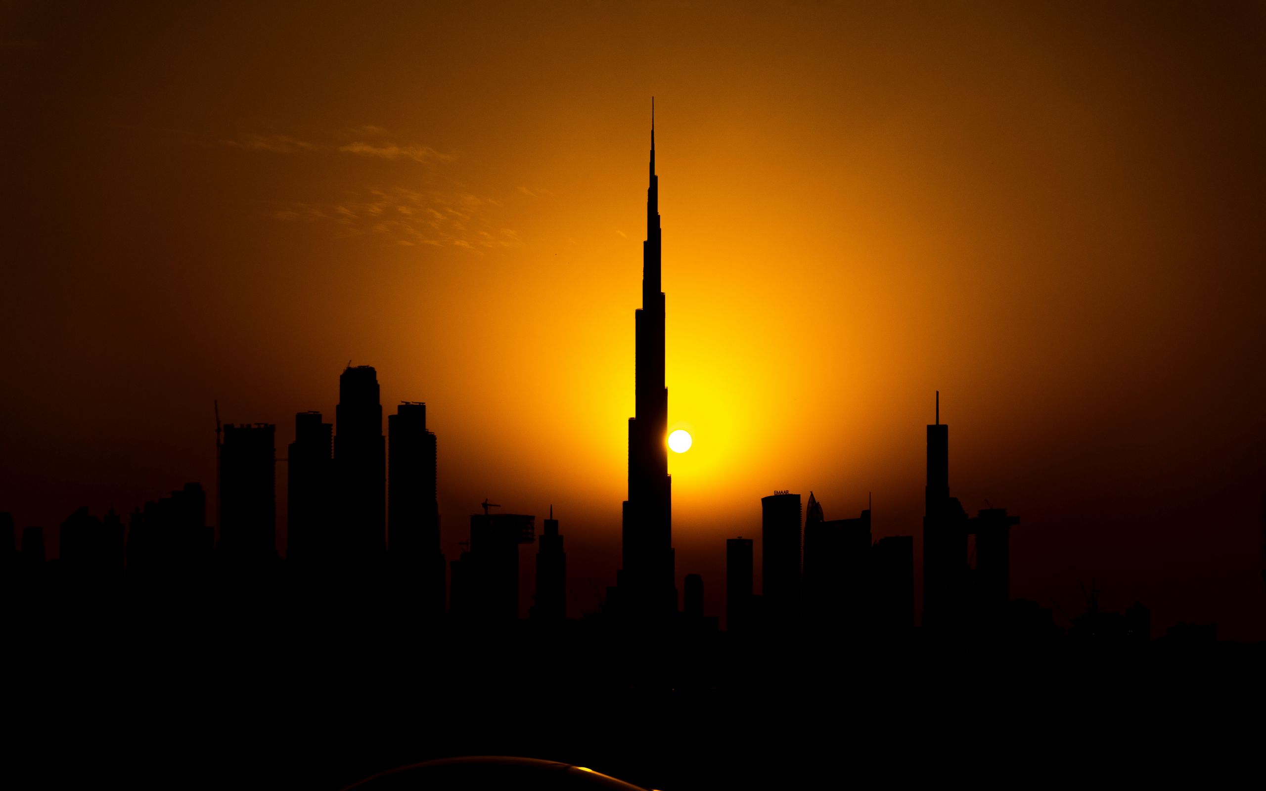 Download wallpaper 2560x1600 sunset, city, building, silhouette ...