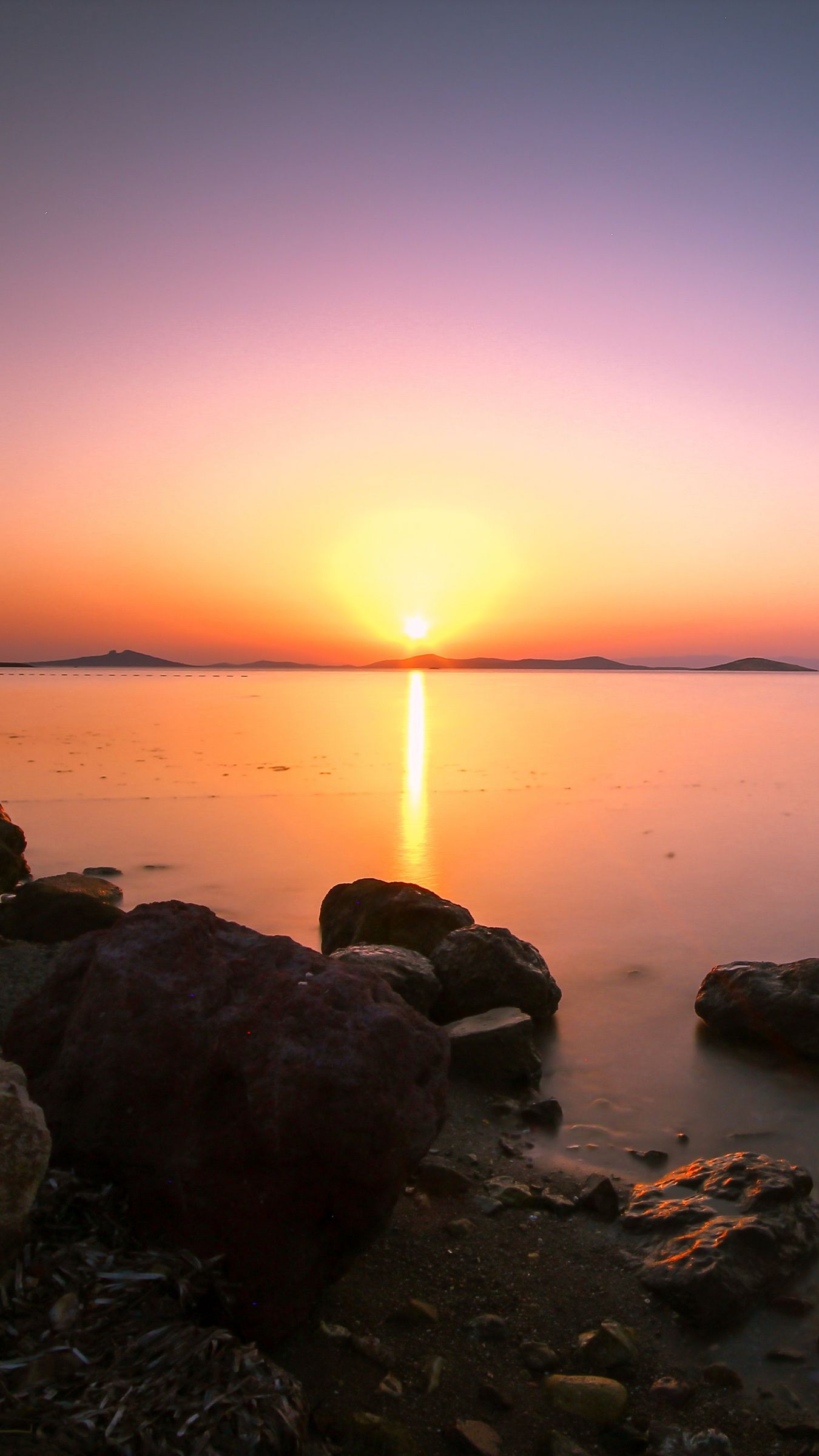 Download wallpaper 1350x2400 sunset, horizon, stones, sea iphone 8+/7 ...