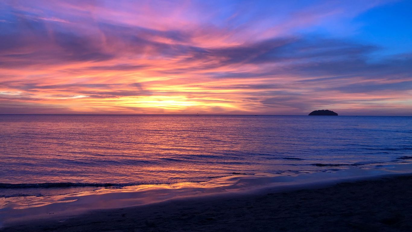 Download wallpaper 1366x768 sunset, sky, coast, water tablet, laptop hd ...