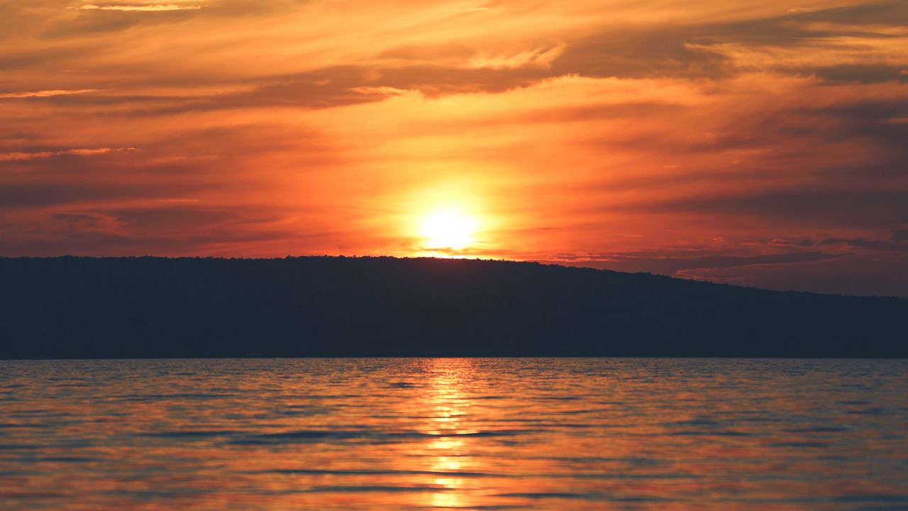 Wallpaper sunset, sun, water, island, horizon hd, picture, image
