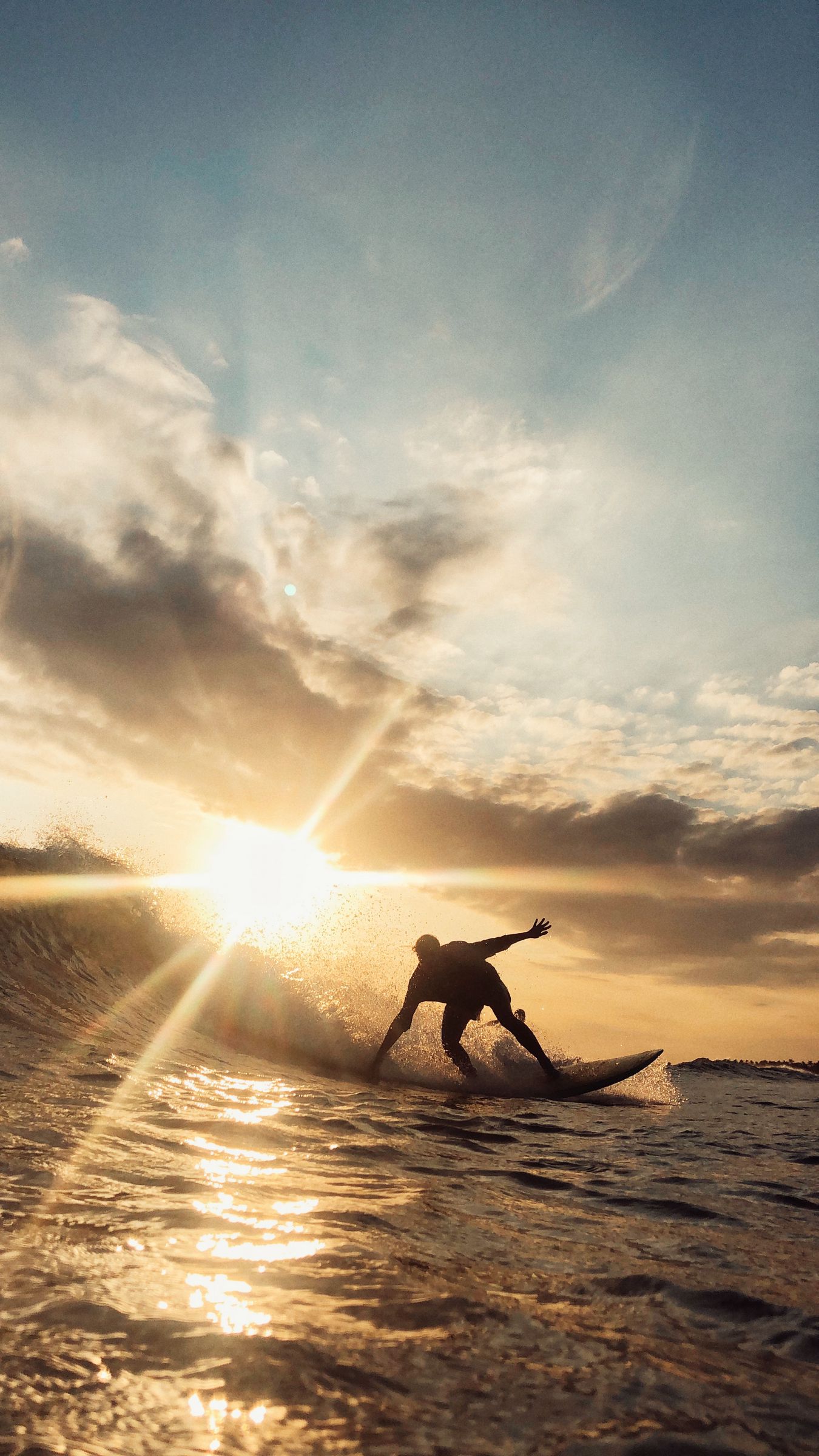 Download wallpaper 1350x2400 surfer, wave, sun, ocean, sunlight, glare ...