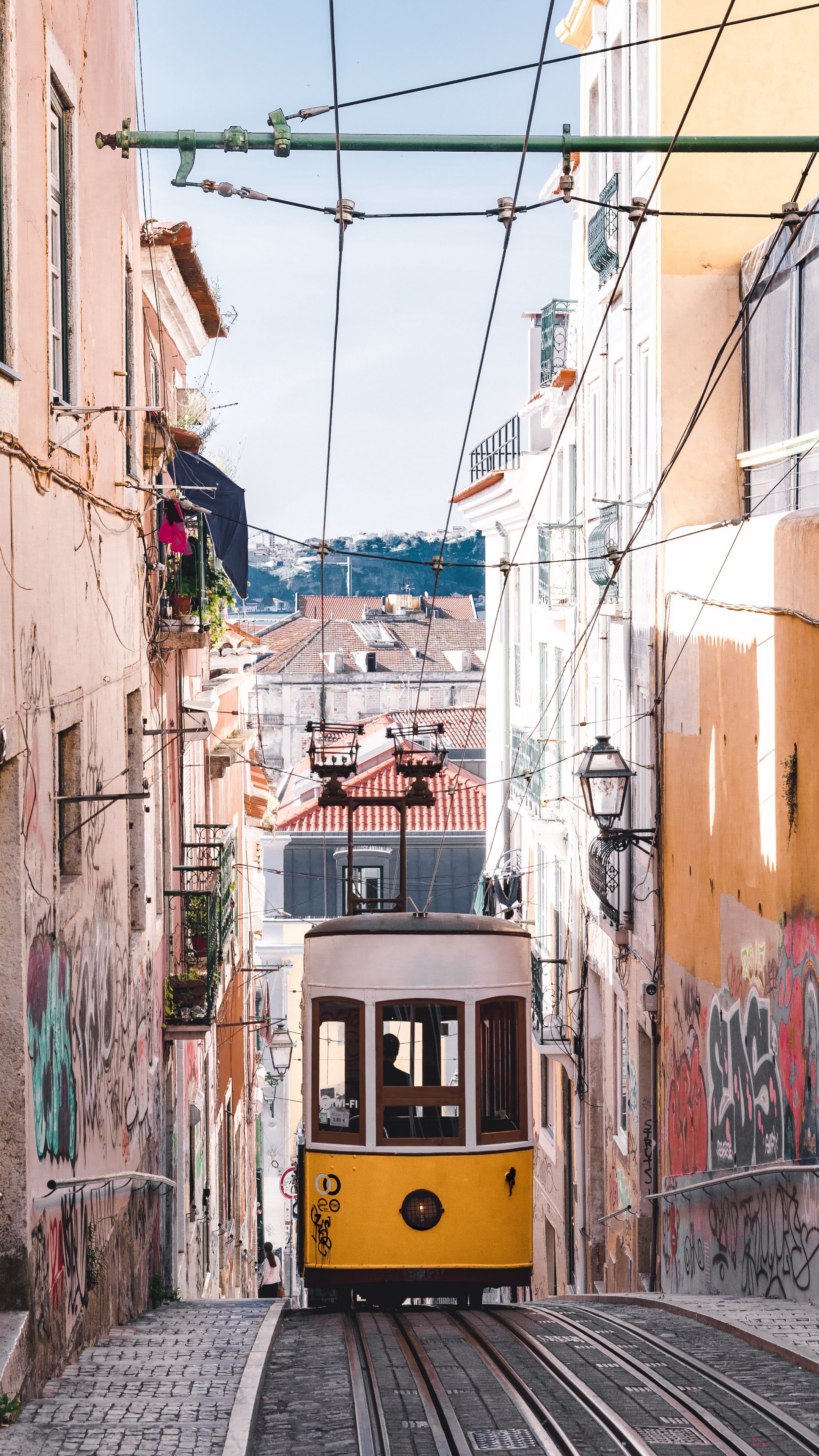 Download wallpaper 2160x3840 tram, yellow, city, street, buildings ...