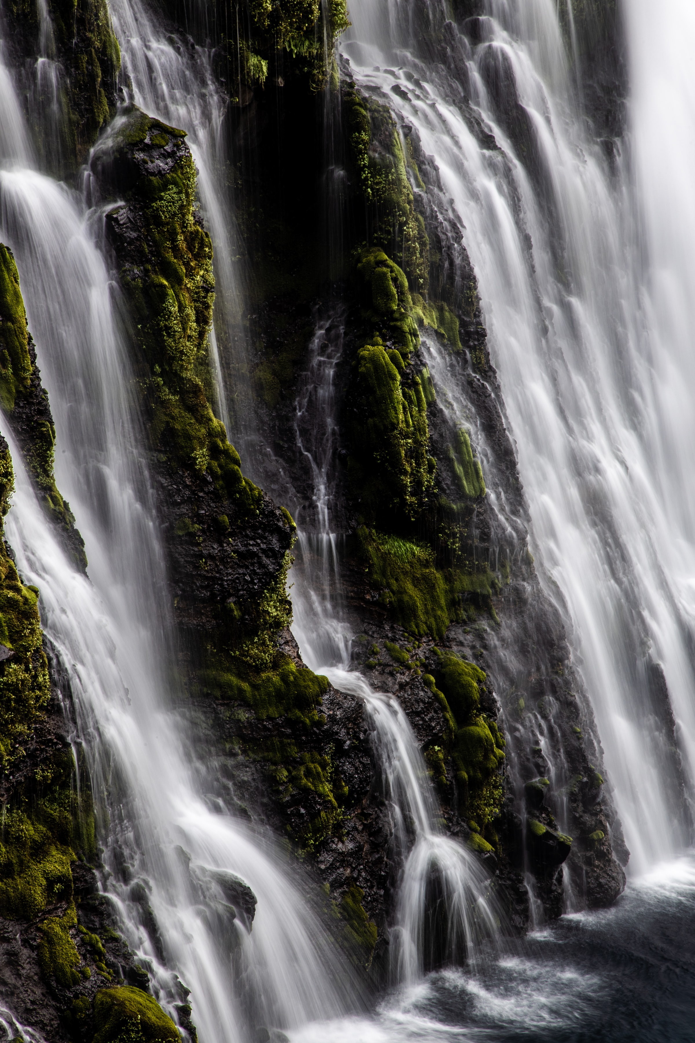 Download wallpaper 2400x3600 waterfall, moss, rocks, stone hd background