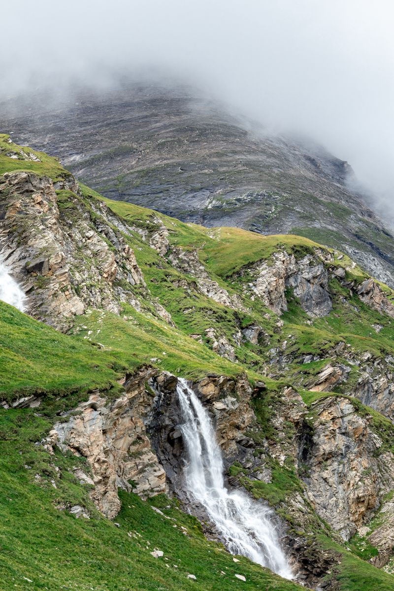 Download wallpaper 800x1200 waterfall, slope, rocks, grass, landscape ...